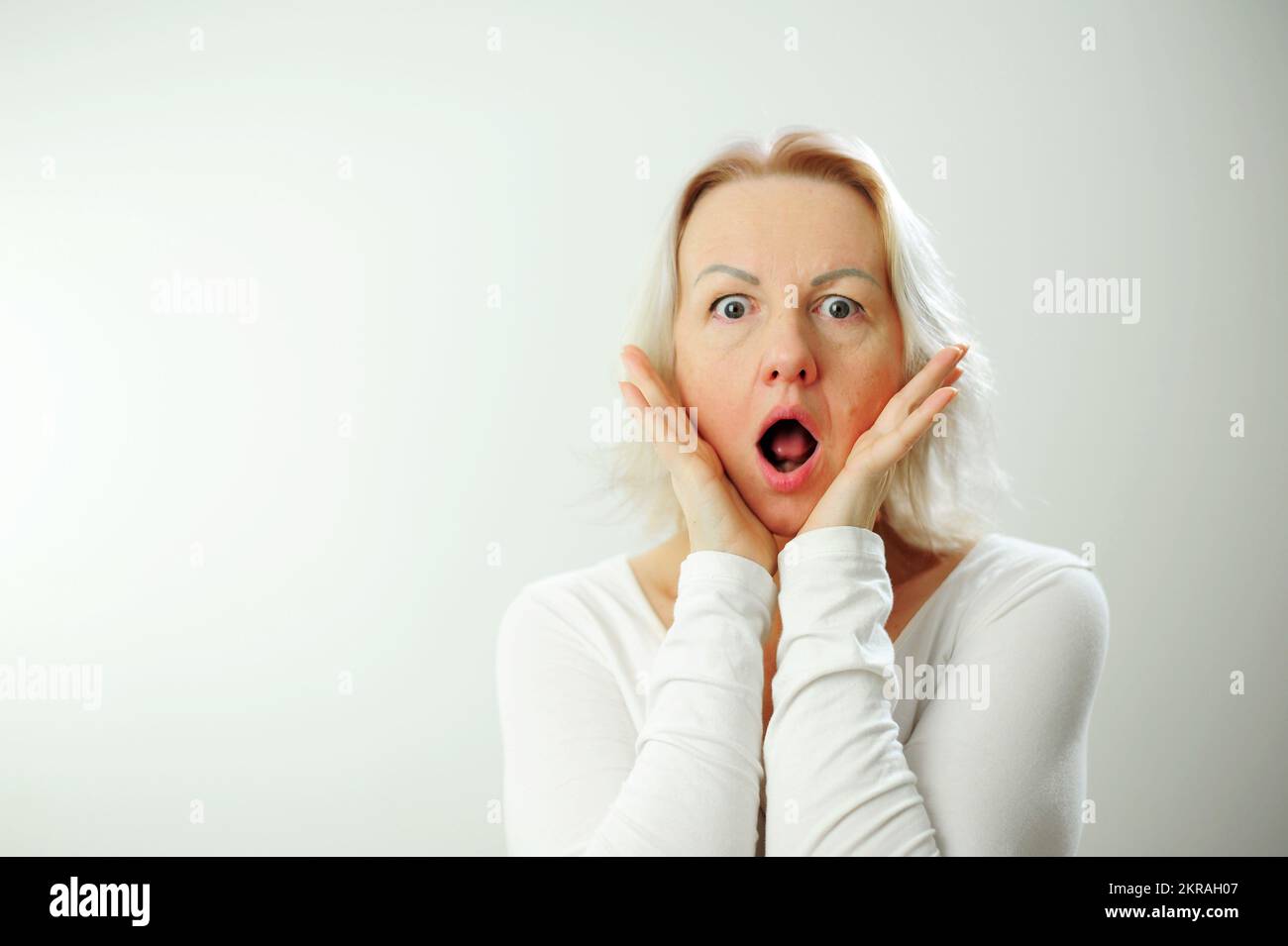 Positive and negative emotions Woman surprised she covered her open ...