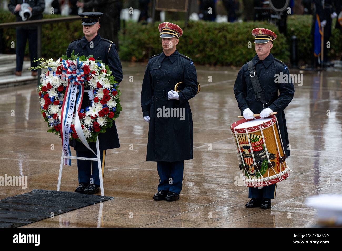 Members of the U.S. Army Band "Pershing's Own" stand at attention at ...