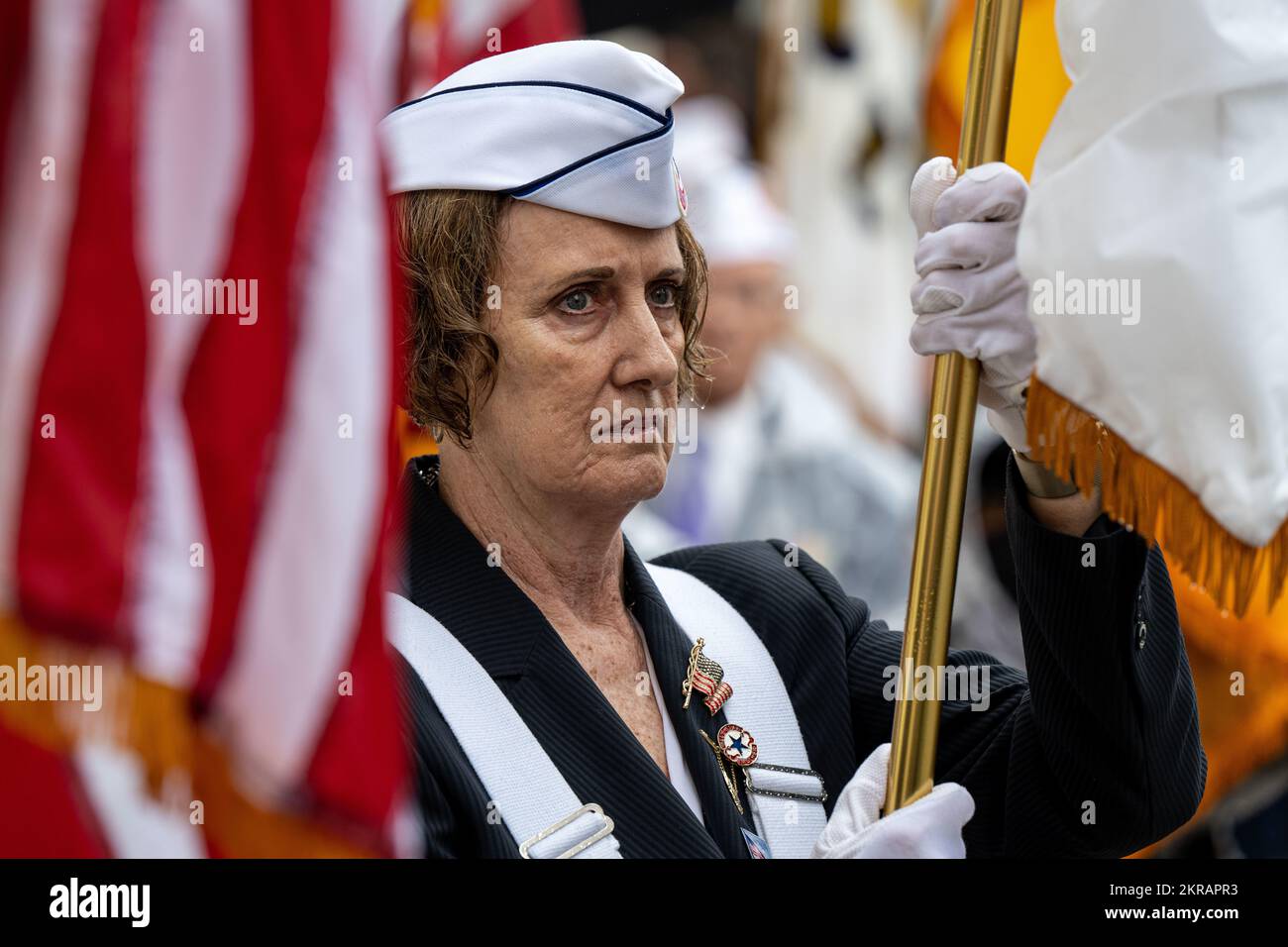 Veterans Association members hold various flags during the National ...