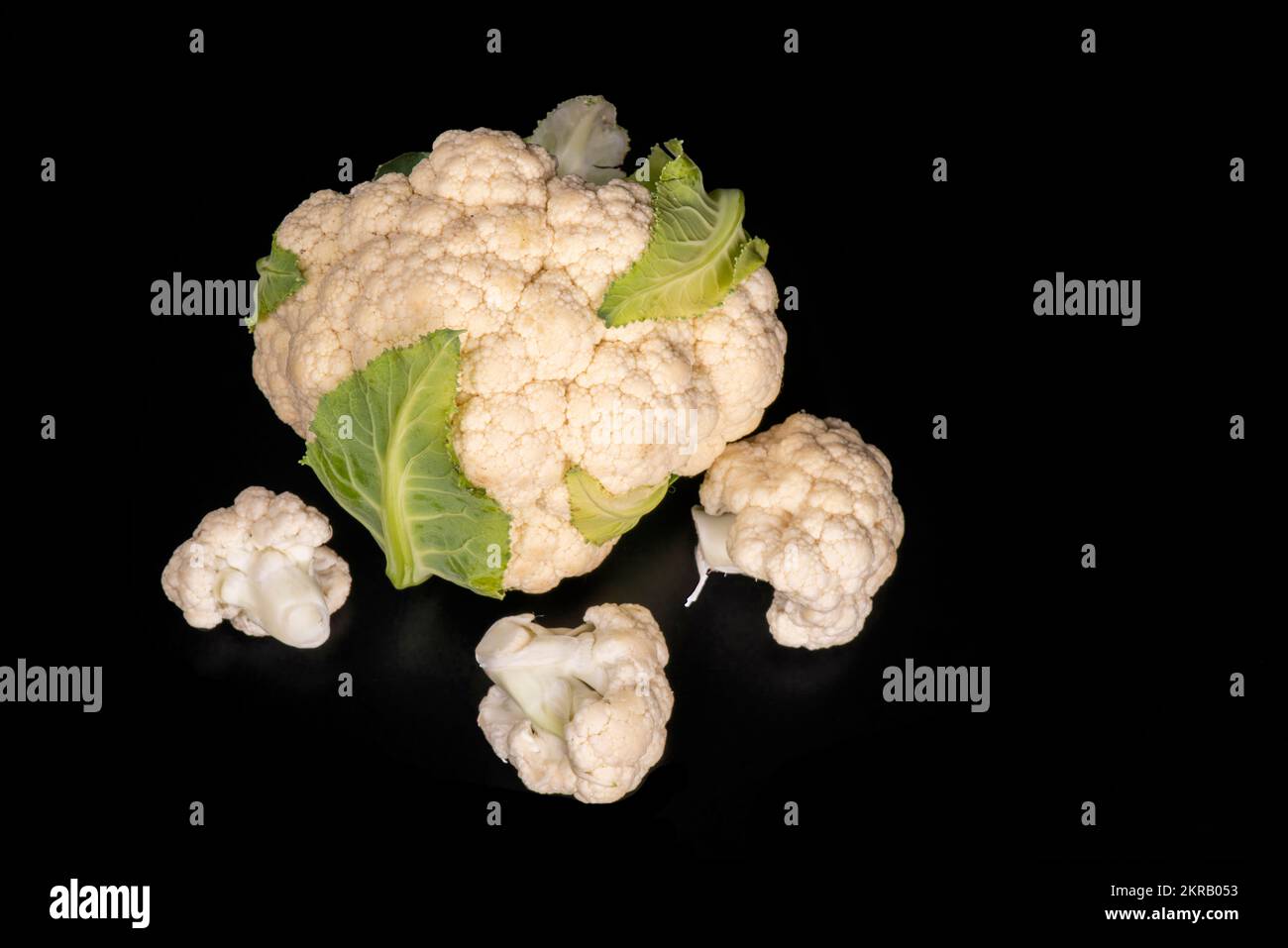 cauliflower close up on black background Stock Photo - Alamy