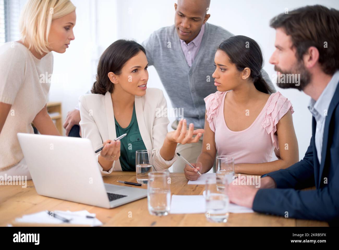 How can we make our Company grow. a group of business people in the ...