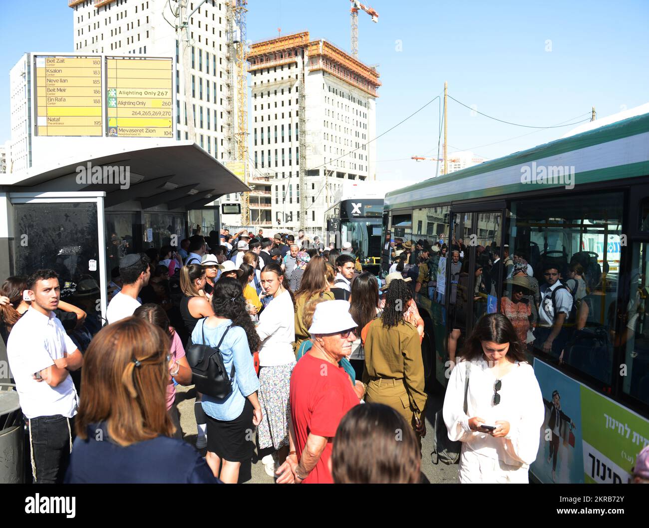 Passengers getting off public buses near t he central bus station in ...
