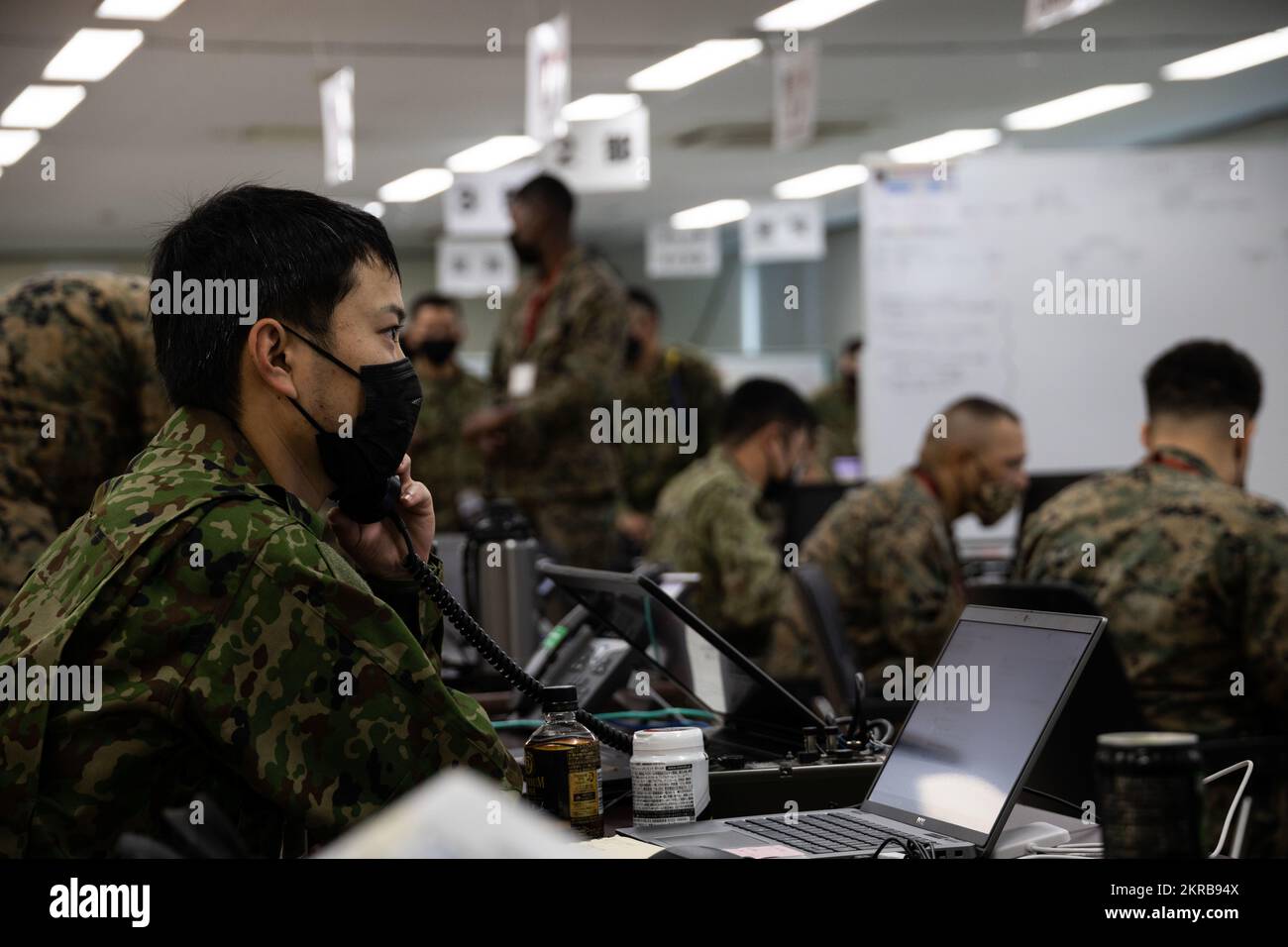U.S. Marines with 3d Marine Division and members of the 15th Brigade ...