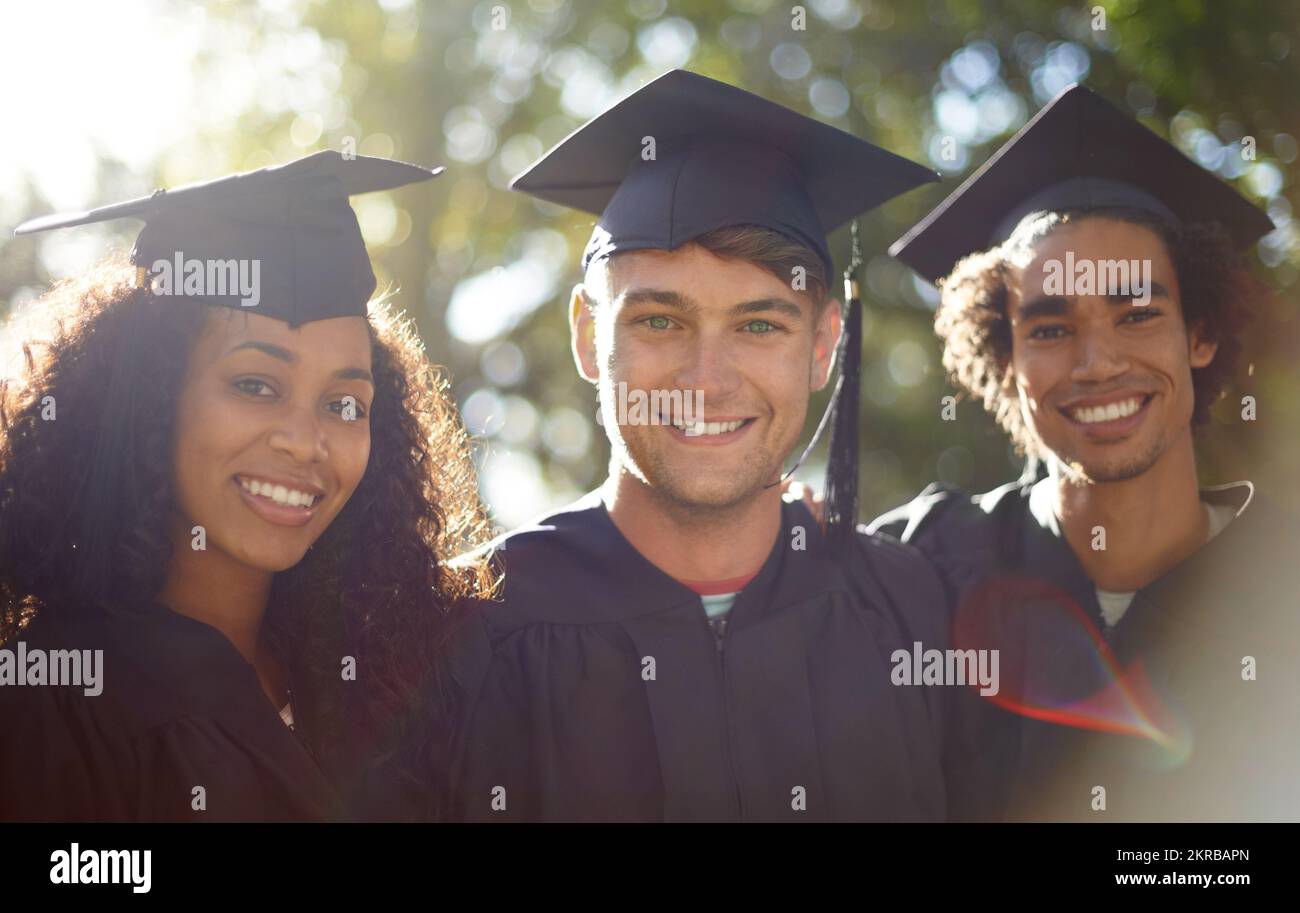 Graduation day. Portrait of three happy students on graduation day ... Graduation day. Portrait of three happy students on graduation day ...