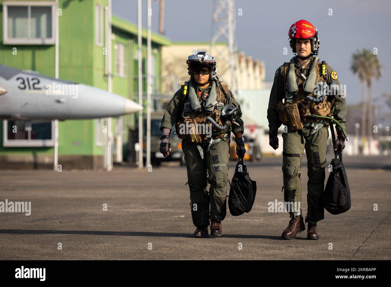 U.S. Marine Corps Maj. Michael Golike, a pilot, and Capt. Heather ...