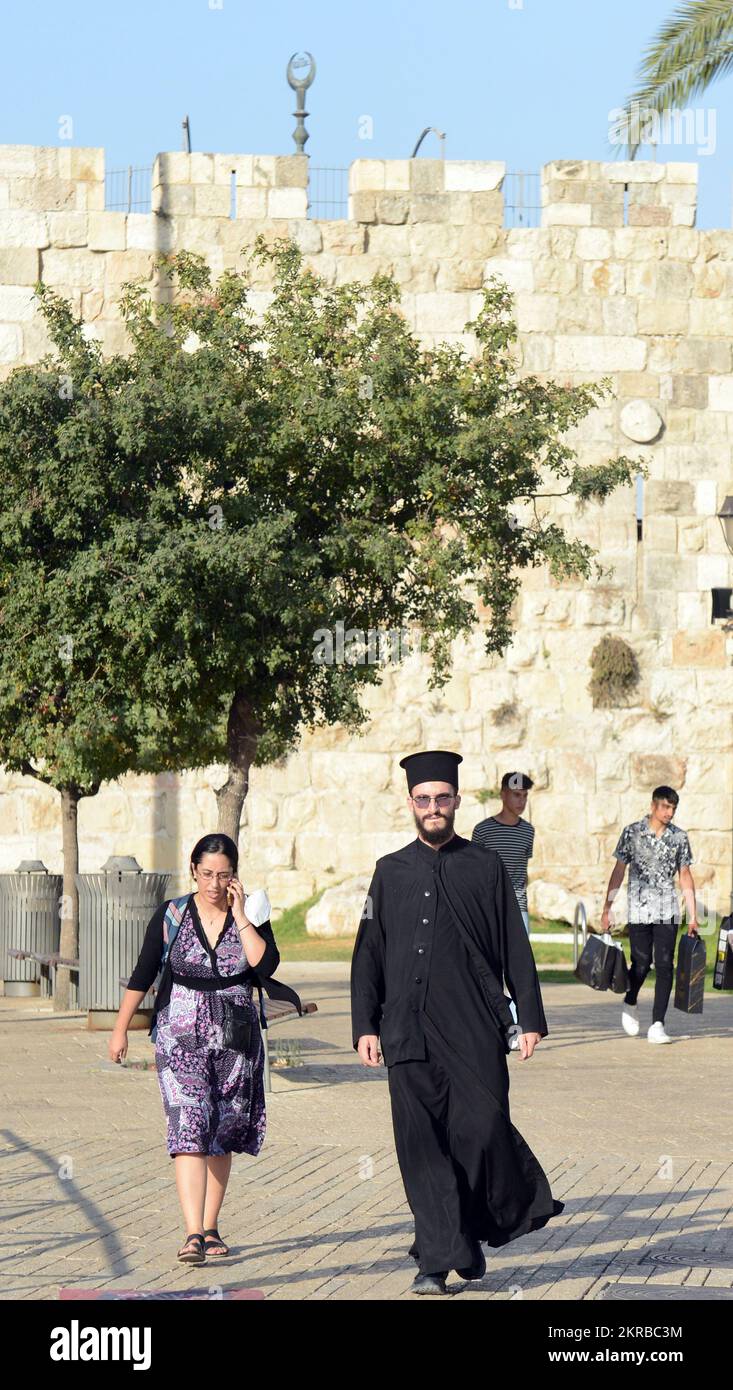 Old priest walking hi-res stock photography and images - Alamy
