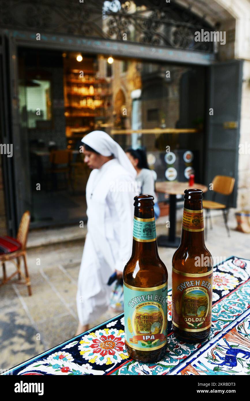 Enjoying a cold Taybeh Palestinian beer at a coffee shop / bar on the ...