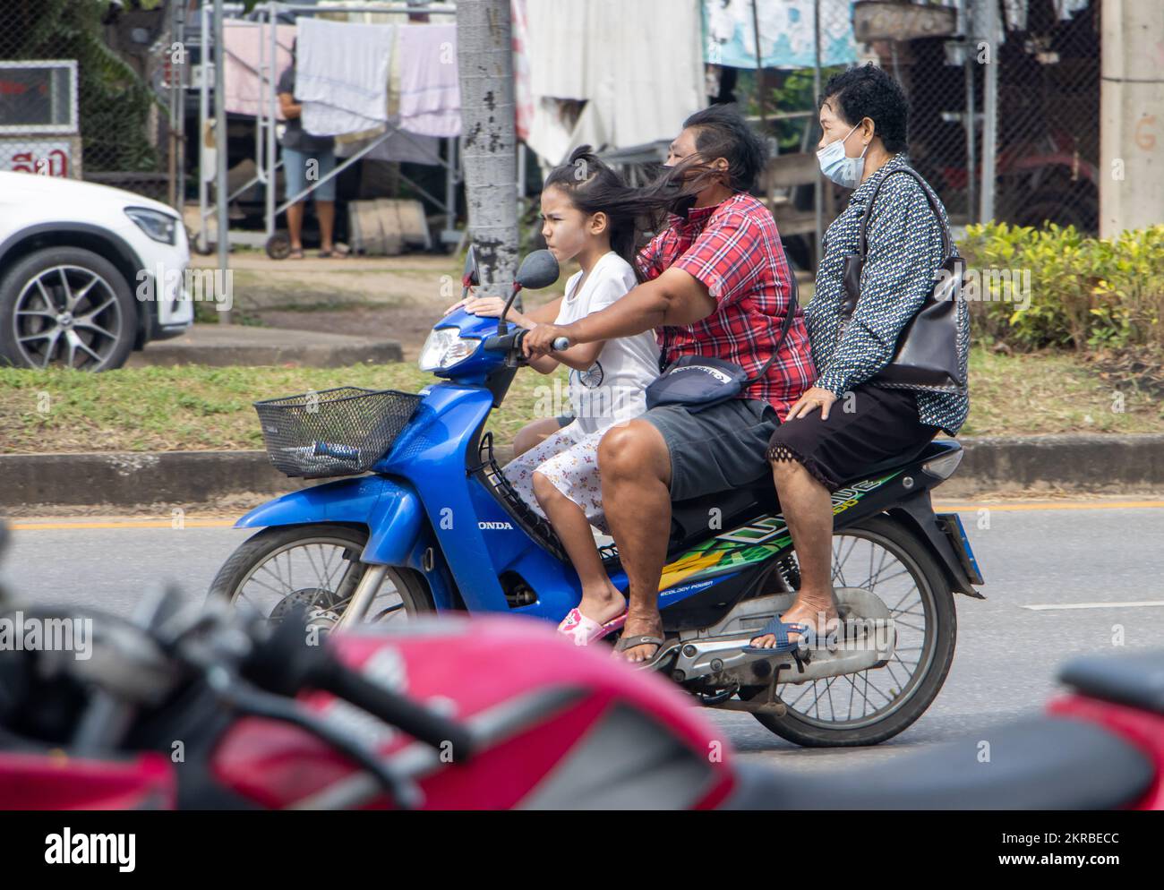 Three people riding a motorcycle hi-res stock photography and images ...