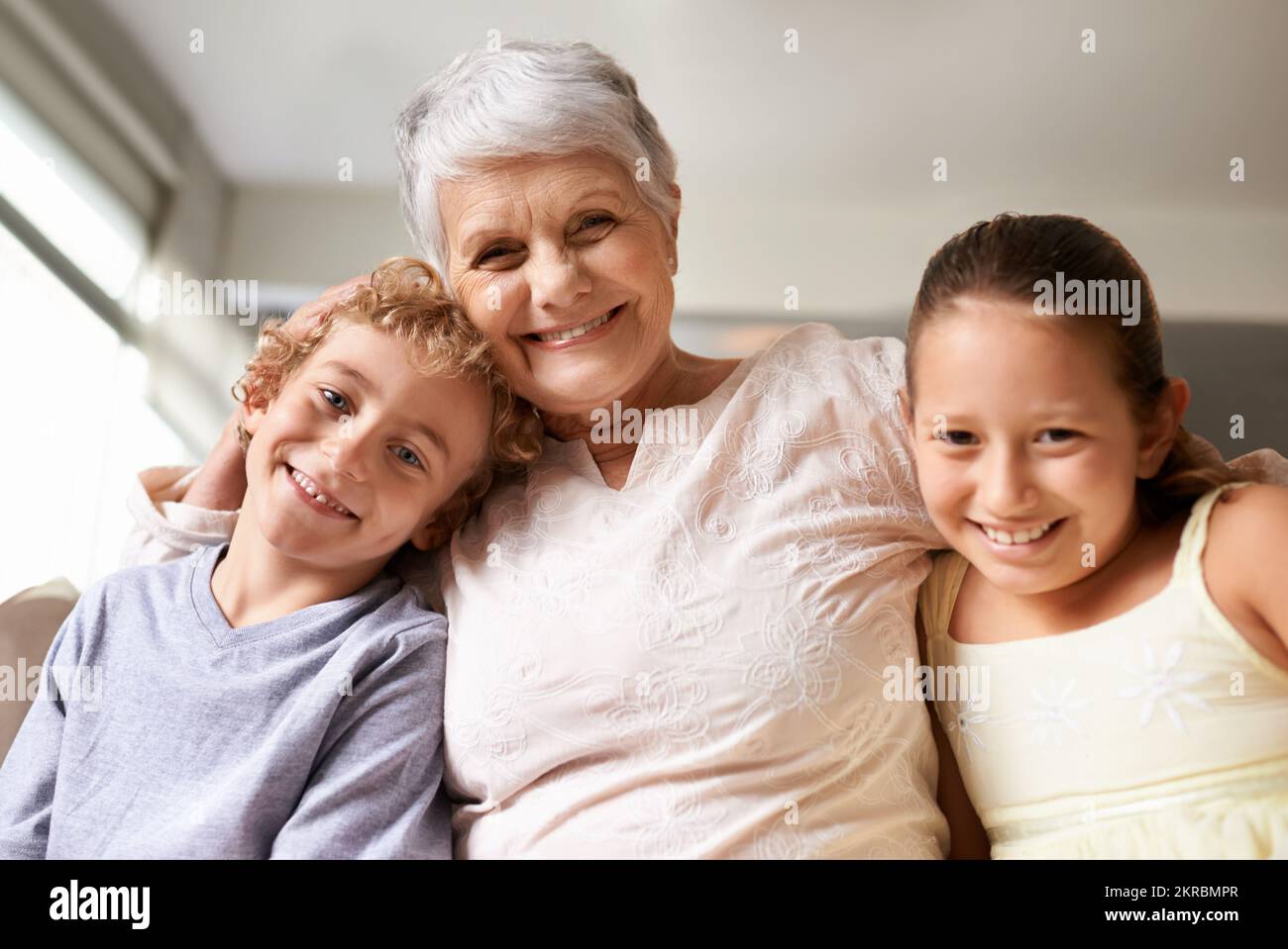 My grandkids light up my life. A granny and her two grandkids smiling ...