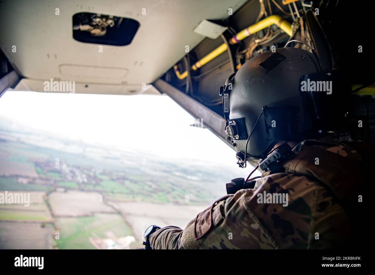 An Special Missions Aviator from the 352d Special Operations Wing looks ...