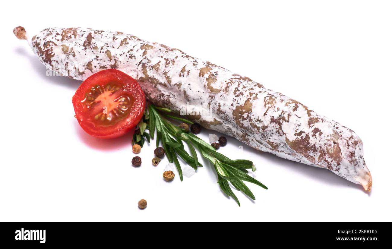 Spanish Fuet thin dried salami sausage isolated on a white background ...