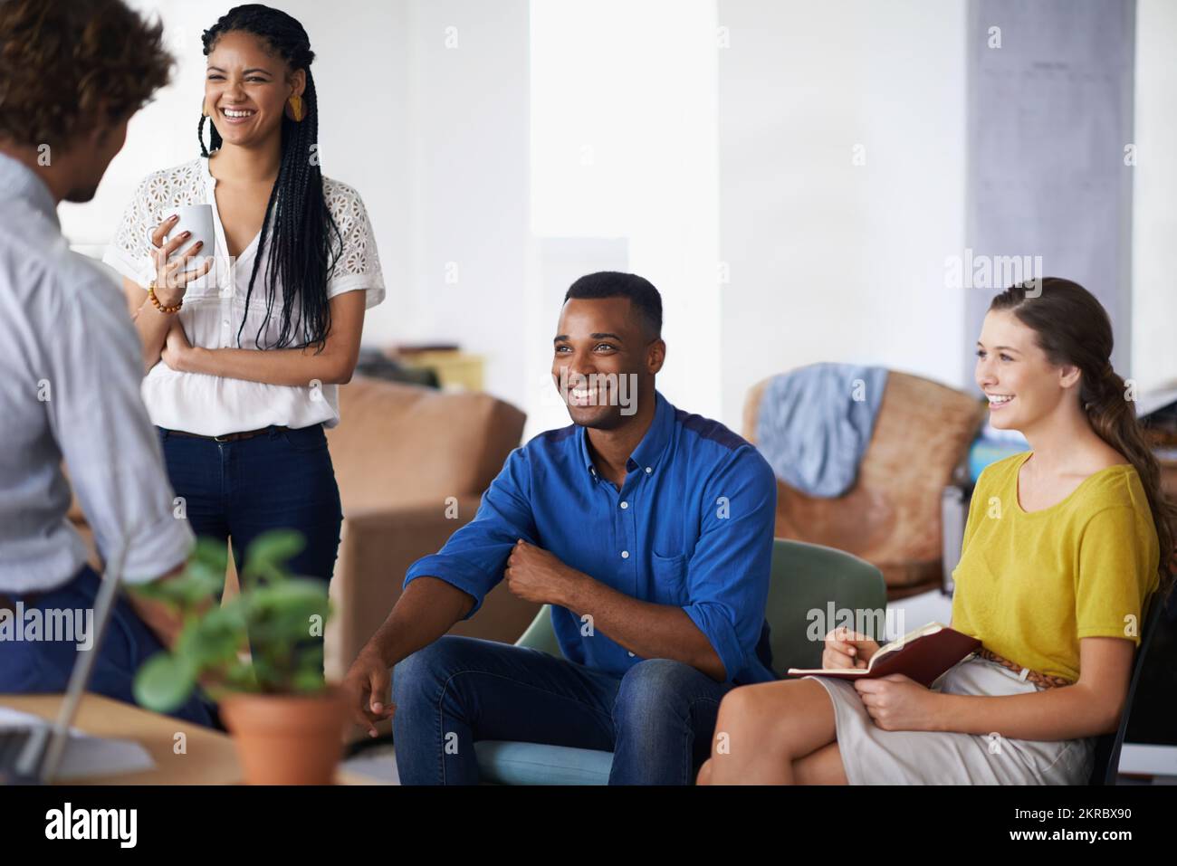 Distributing work tasks. a group of colleagues in a meeting Stock Photo ...