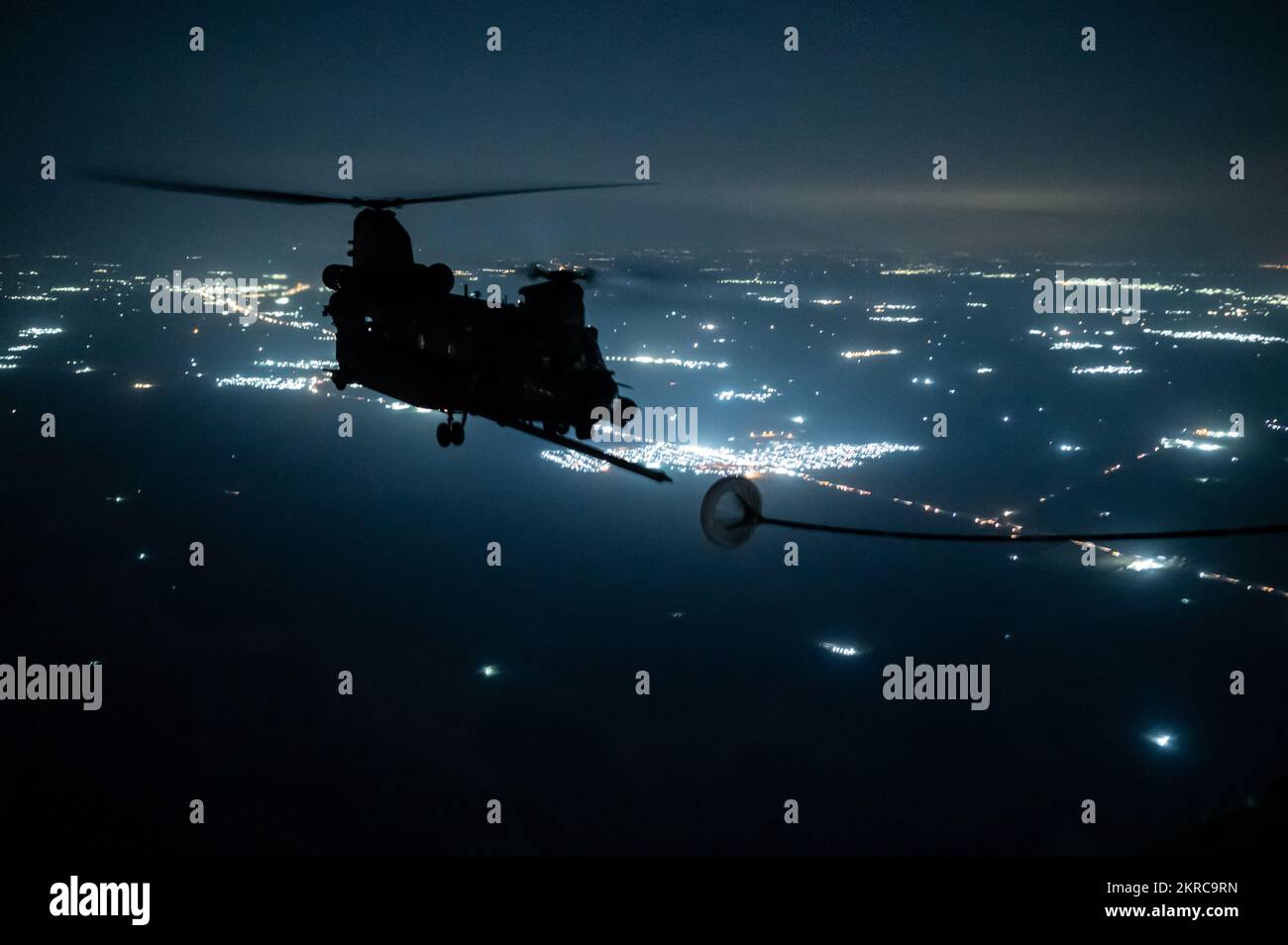 U.S. Army CH-47 Chinook aircrew prepare to perform helicopter aerial ...