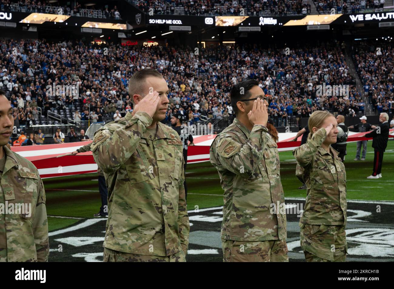 Airmen from Nellis and Creech Air Force Bases render a salute at the ...