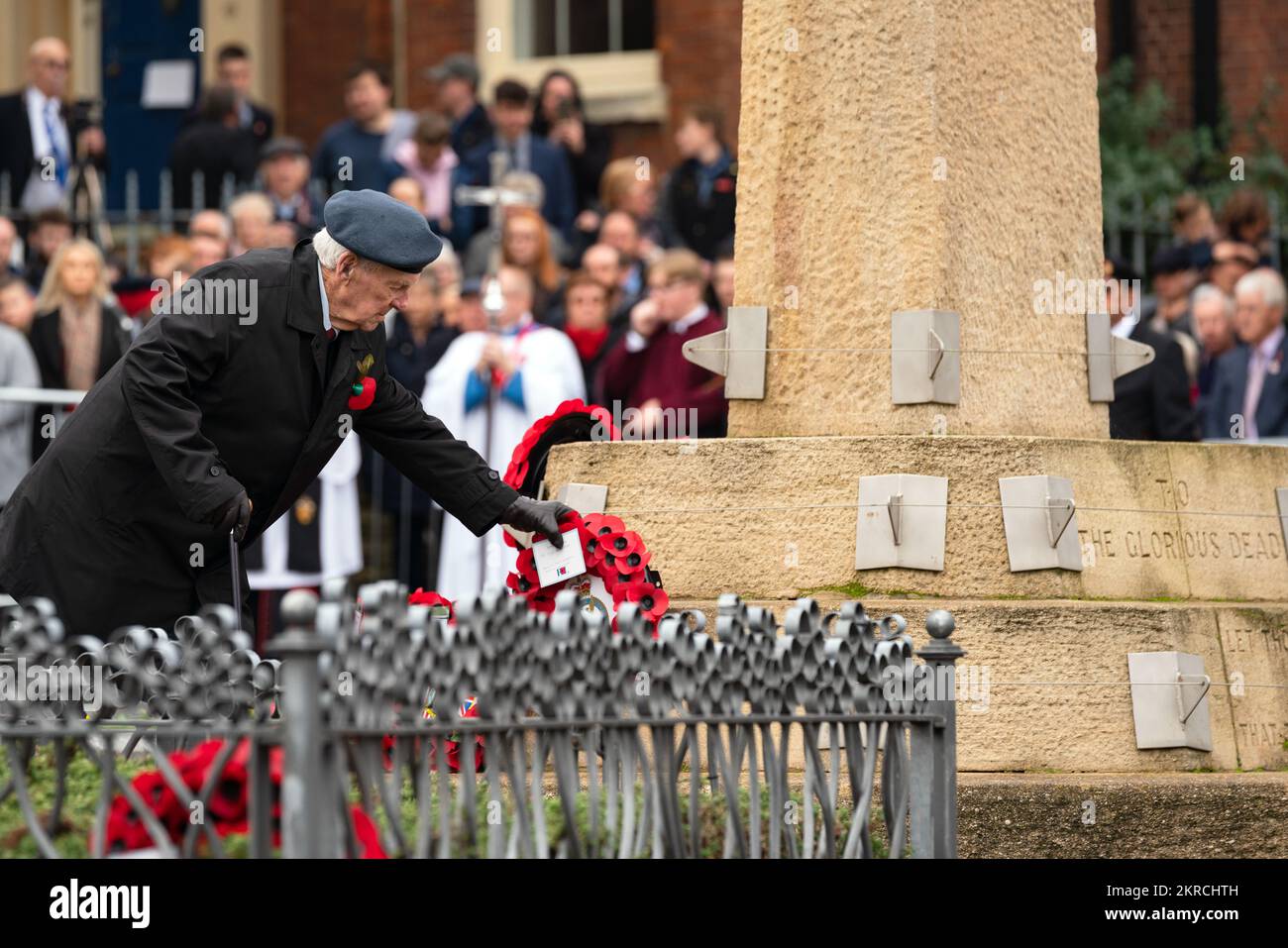 A local representative lays a red poppy wreath at the foot of Angel ...