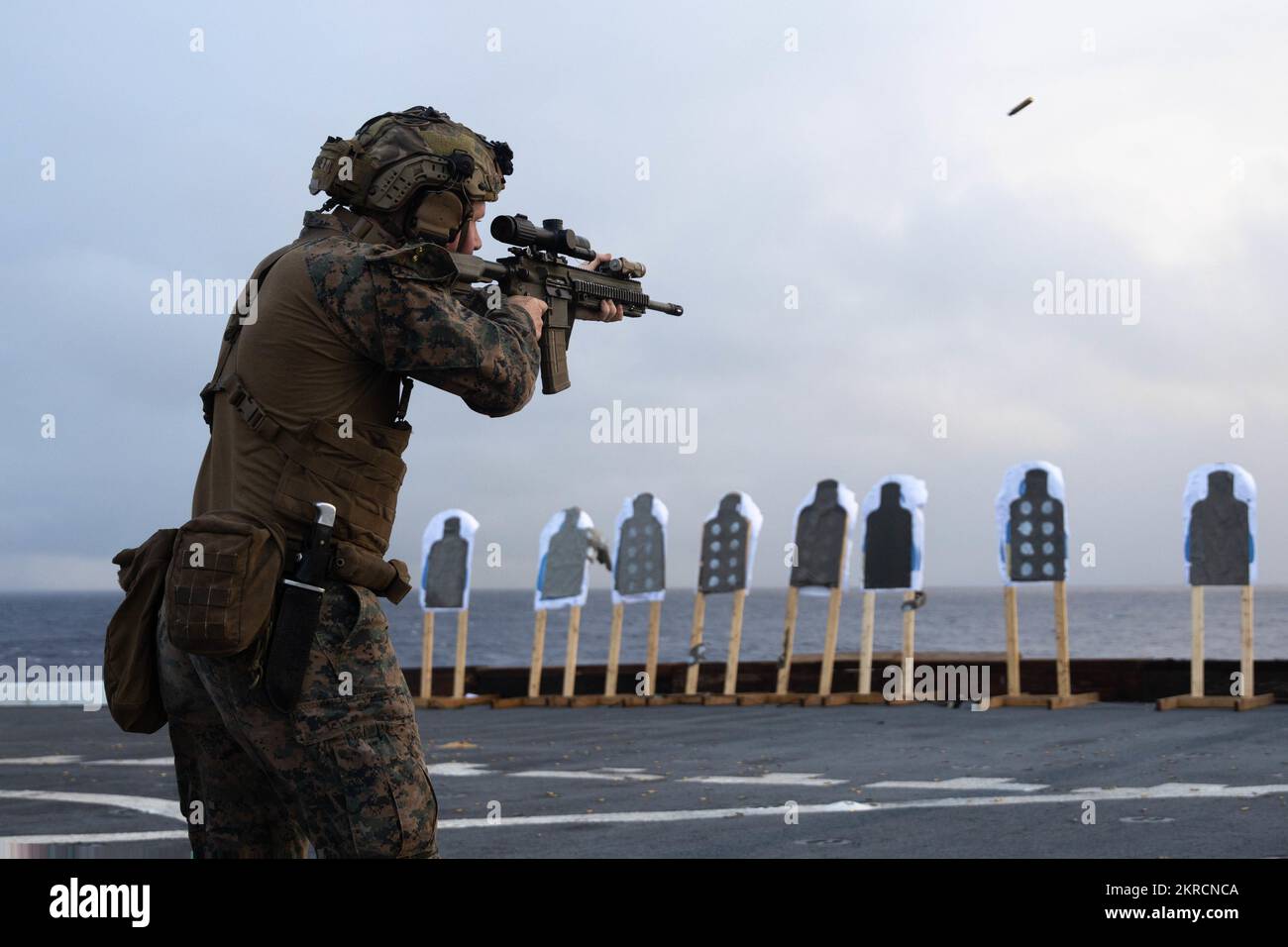 U.S. Marines with 1st Battalion, 2nd Marines conduct a rifle range with ...