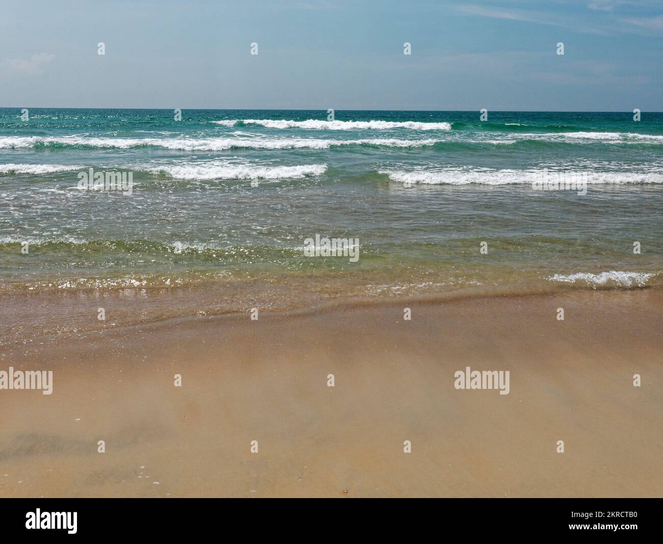 View of a tropical wave water seashore and sandy beach of Mobor in ...