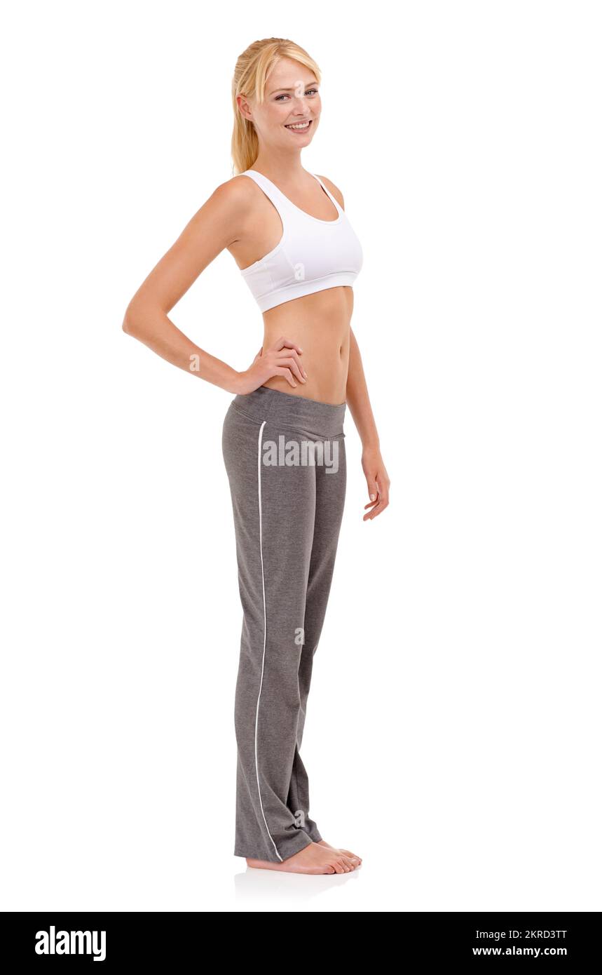 Sporty and confident. Full-length portrait of a sporty young woman standing with her hand on her ...