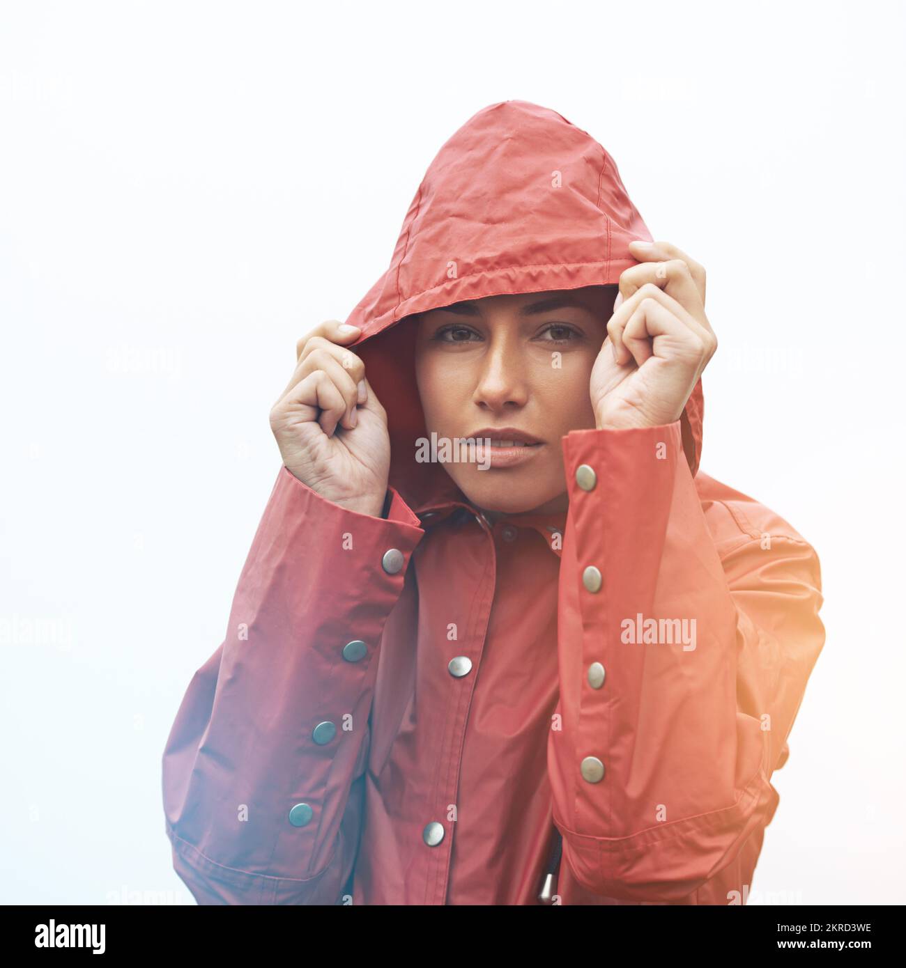 This rain came outta nowhere. Cropped portrait of a young young woman ...