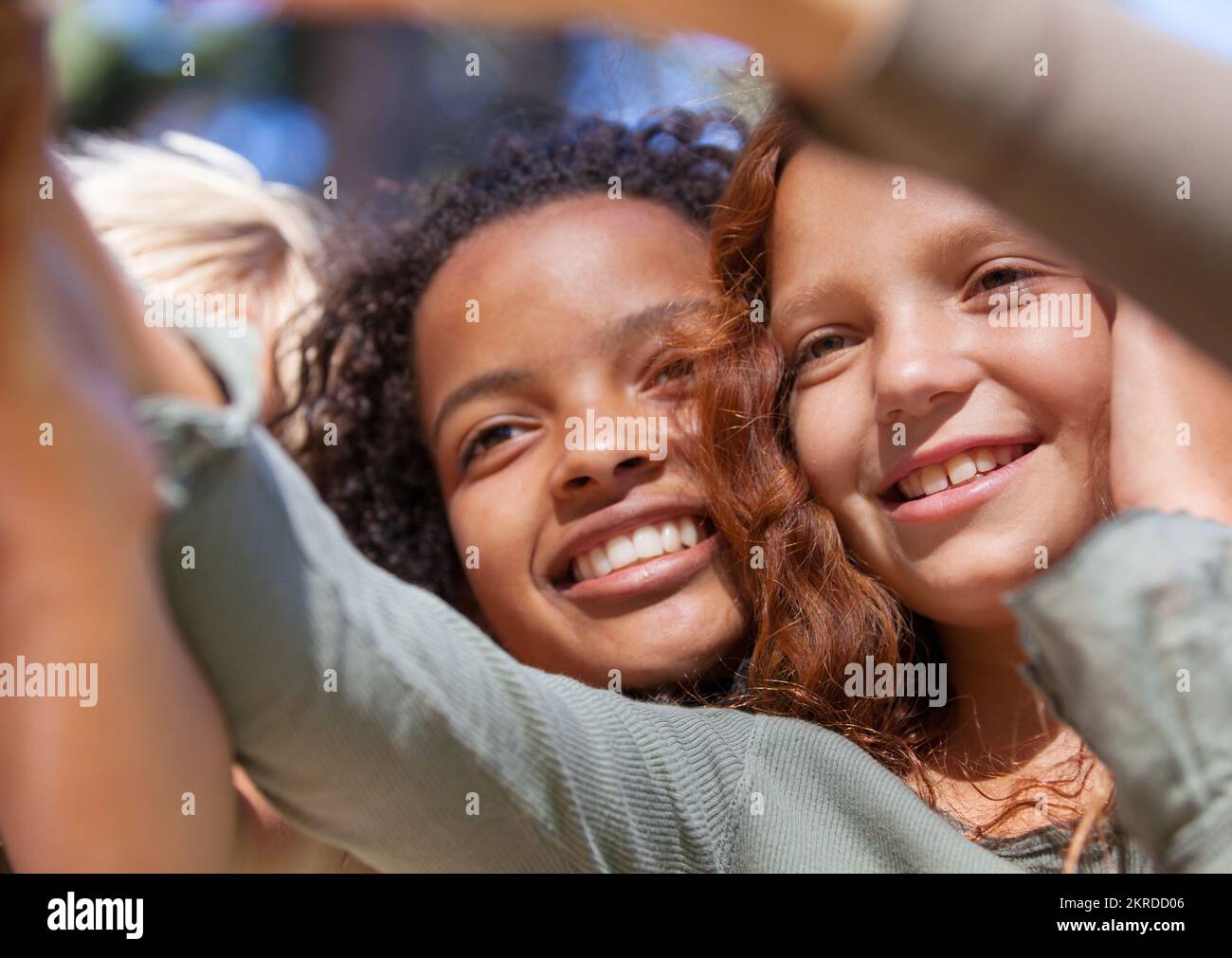 Friends forever and ever. a group of two young girls taking a self ...