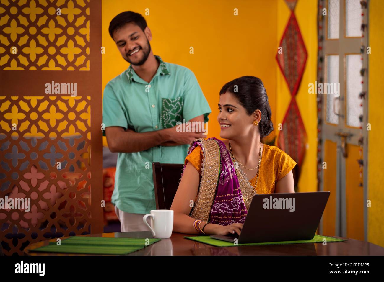 Man standing behind table hi-res stock photography and images - Alamy