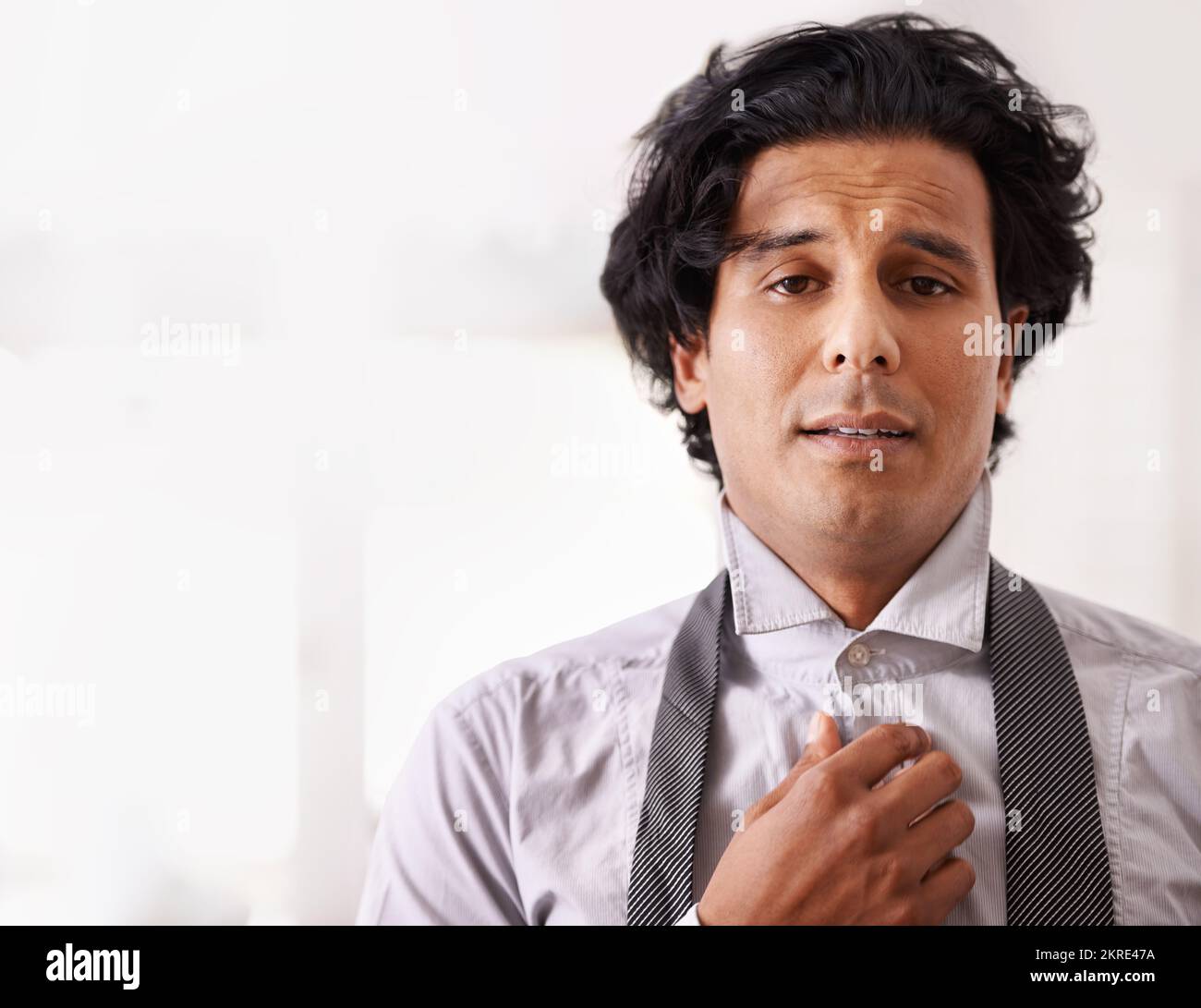 Hes not ready for this day. Portait of a businessman looking exhausted ...