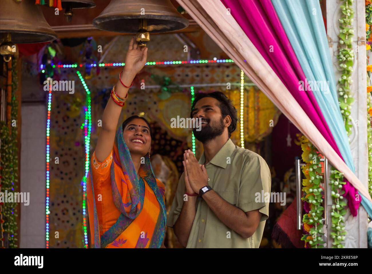 Man hands together praying temple hi-res stock photography and images ...