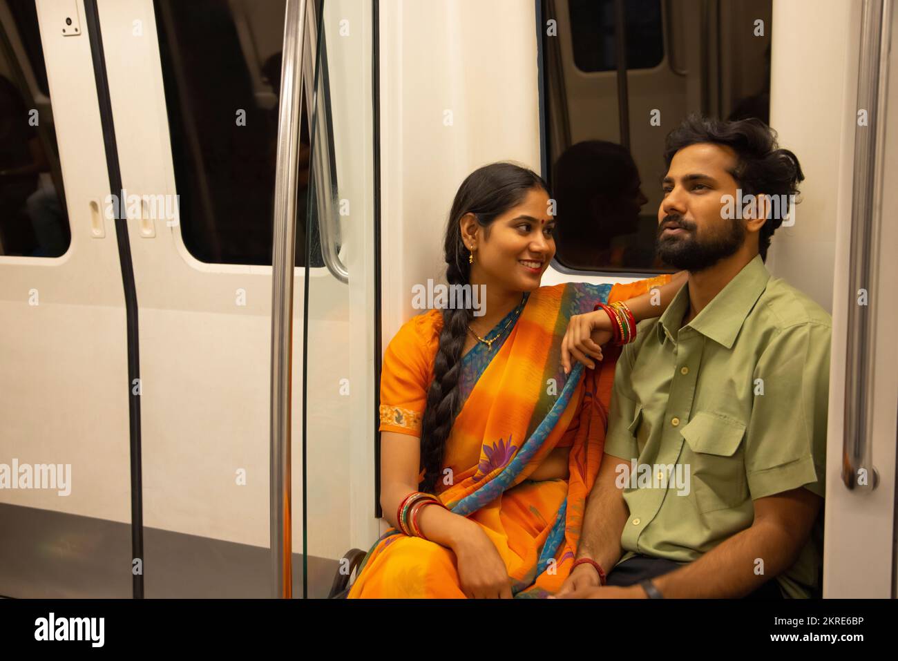 Couple train sitting transport hi-res stock photography and images - Alamy
