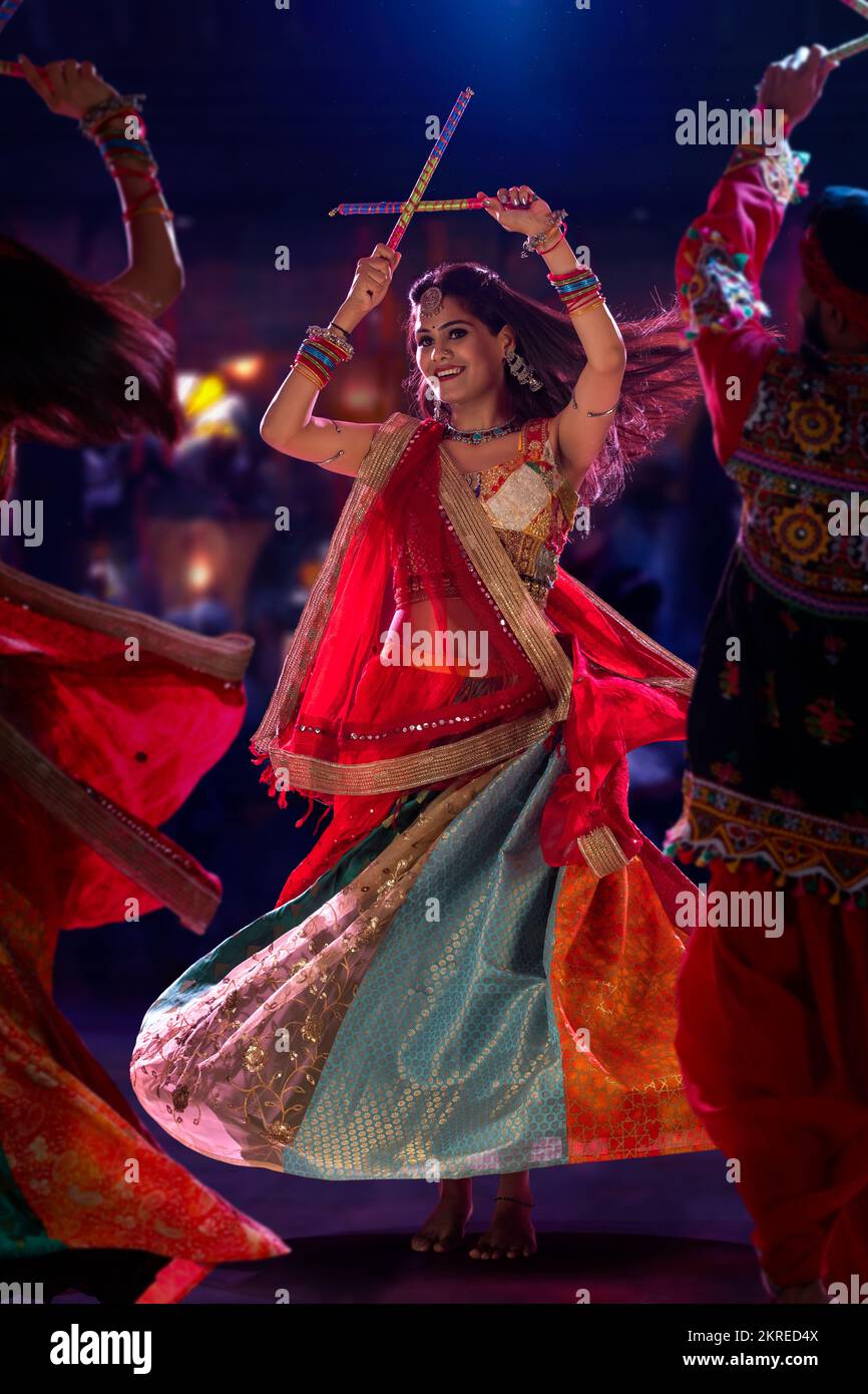 Gujrati woman performing Garba on stage Stock Photo - Alamy