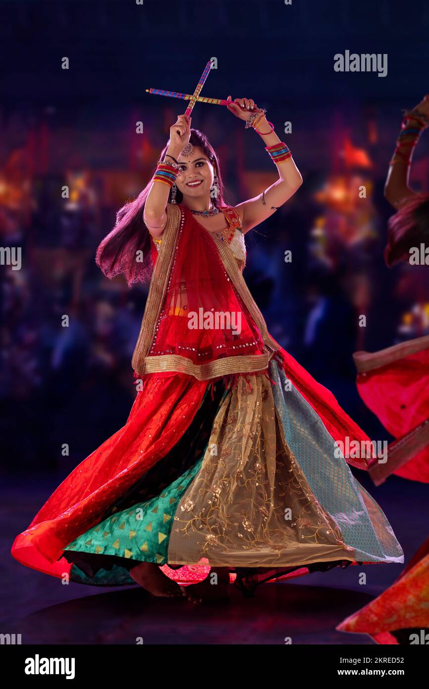 Gujrati woman performing Garba on stage Stock Photo - Alamy