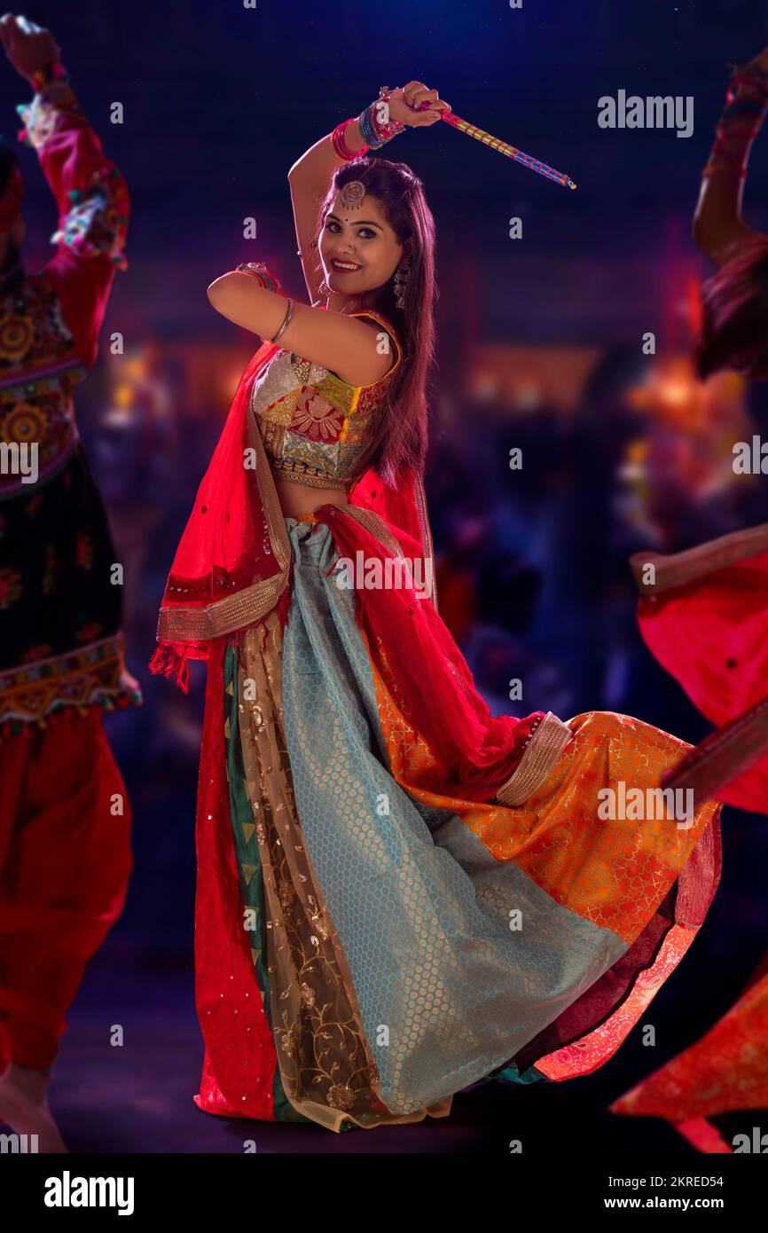 Gujrati woman performing garba on stage hi-res stock photography and ...