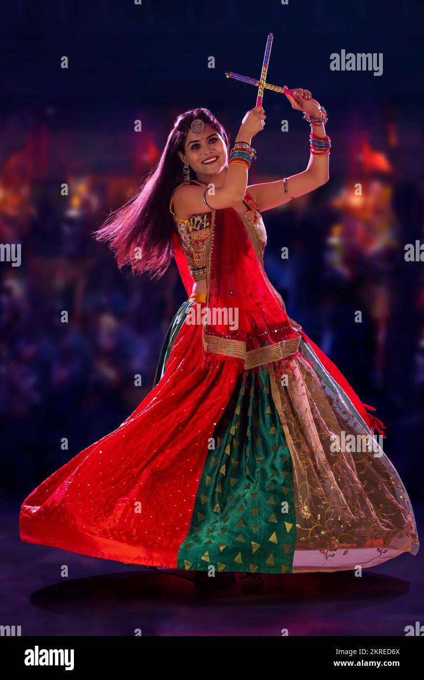 Gujrati woman performing Garba on stage Stock Photo - Alamy