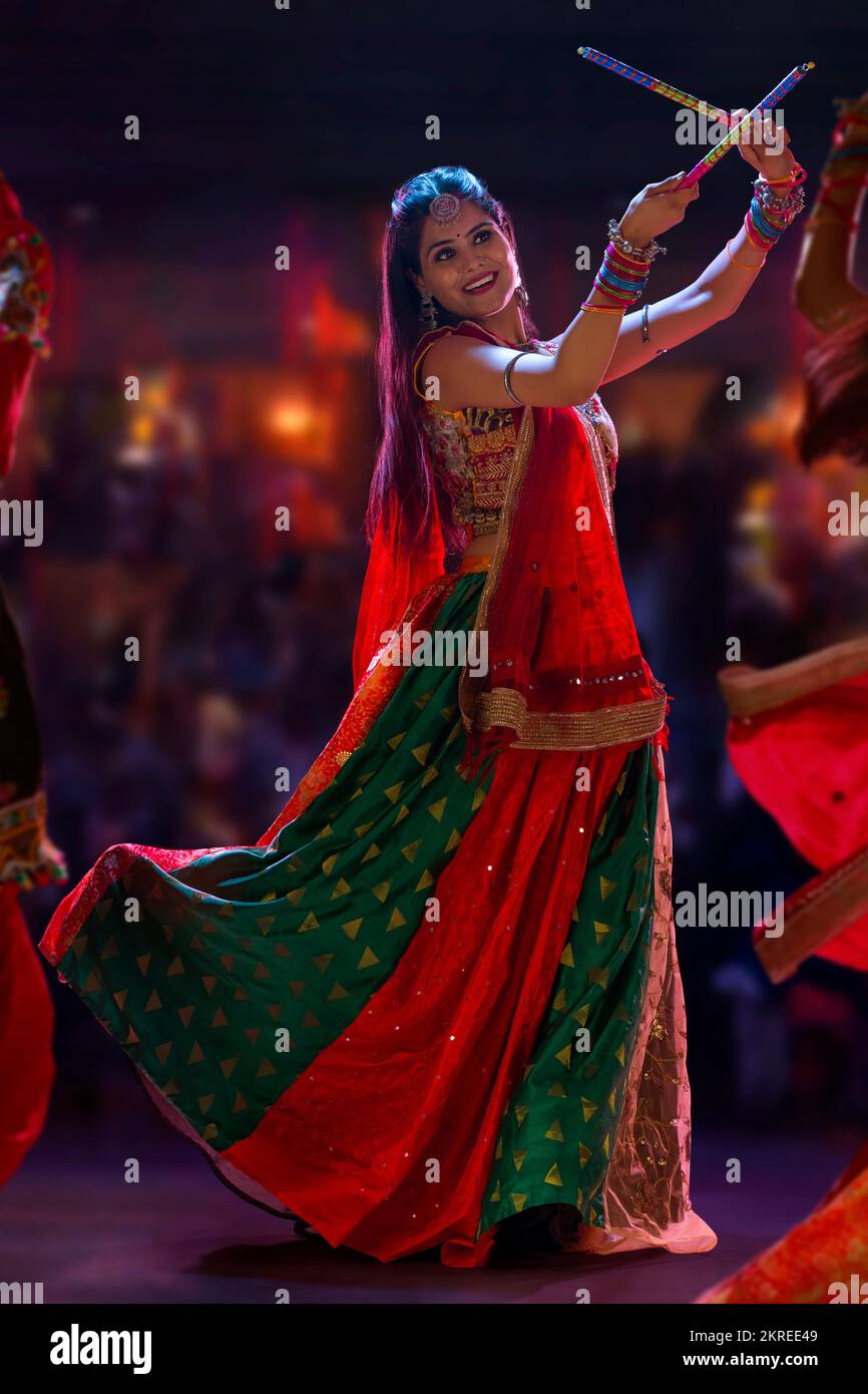 Gujrati woman performing Garba on stage Stock Photo - Alamy