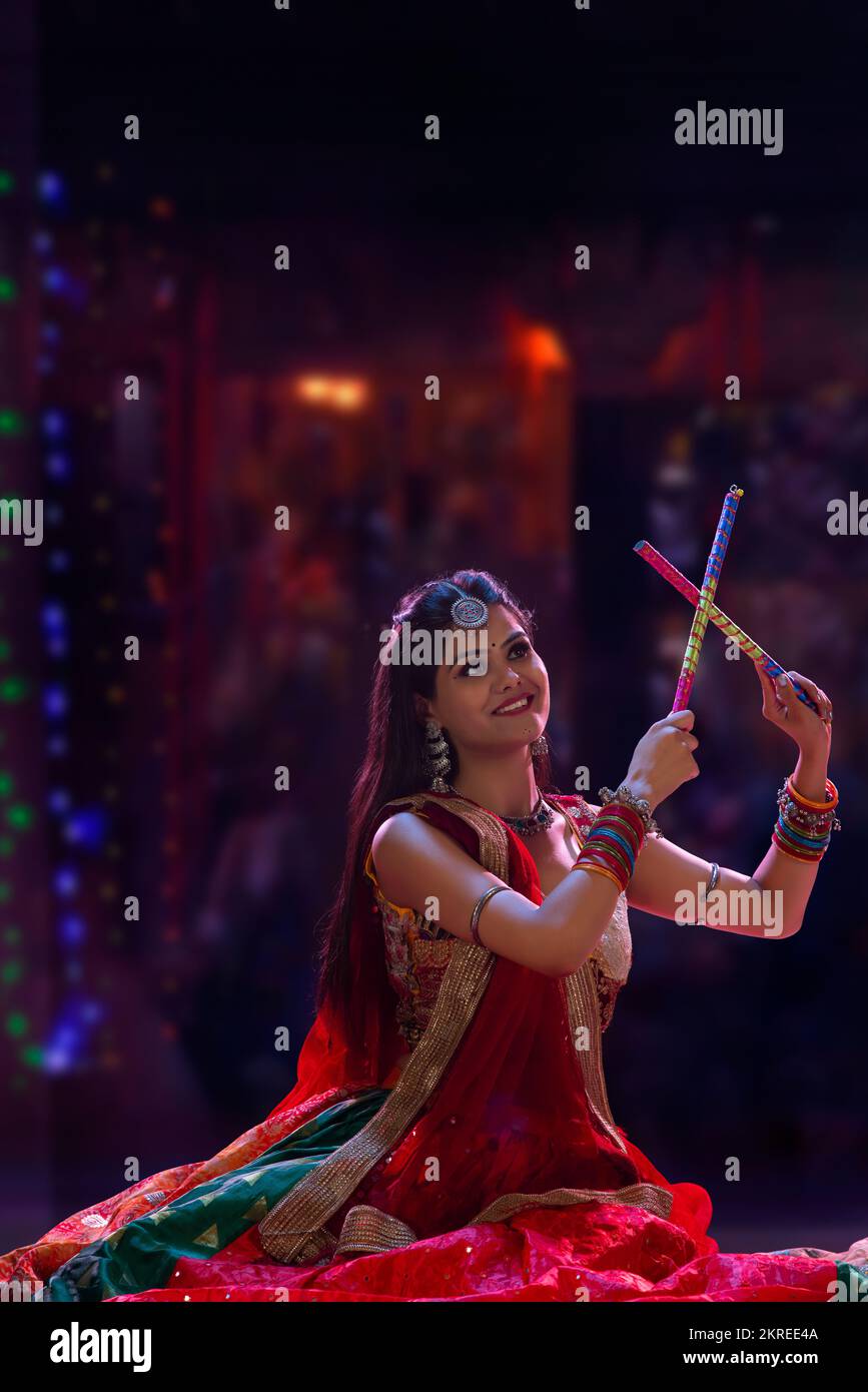 Gujrati woman performing Garba on stage Stock Photo - Alamy