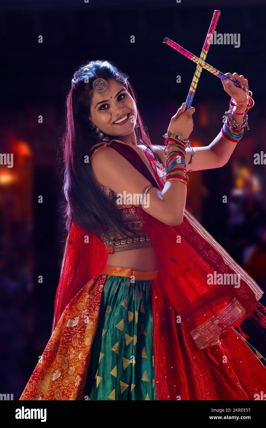 Gujrati woman performing Garba on stage Stock Photo - Alamy