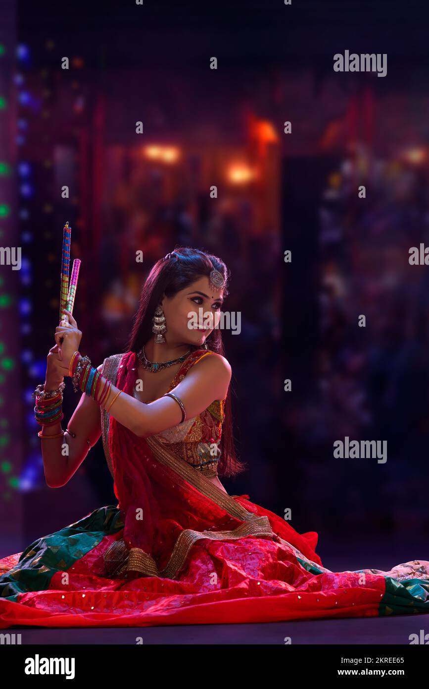 Gujrati woman performing Garba on stage Stock Photo - Alamy