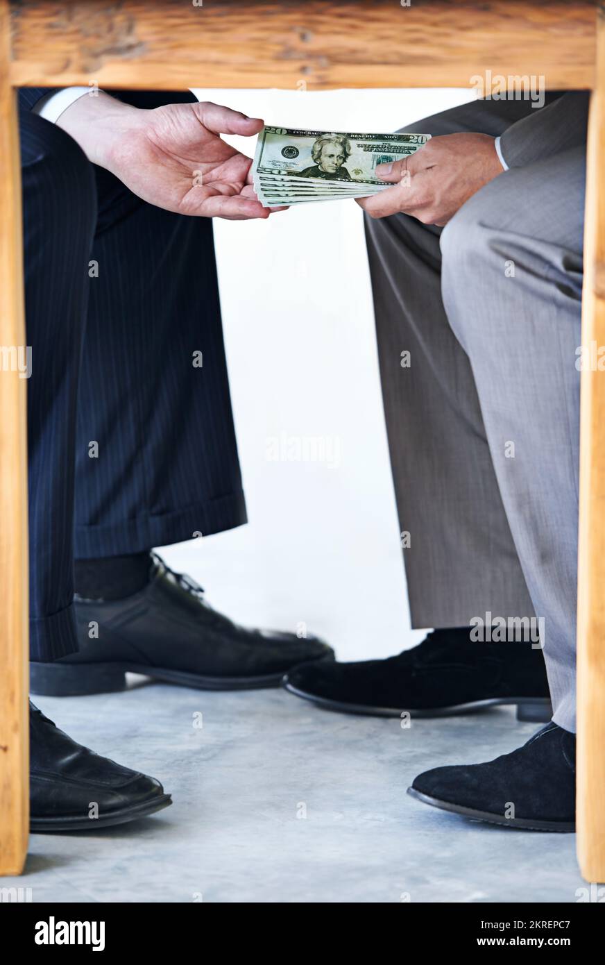 Remember nobody needs to know about this. money passing hands under a ...