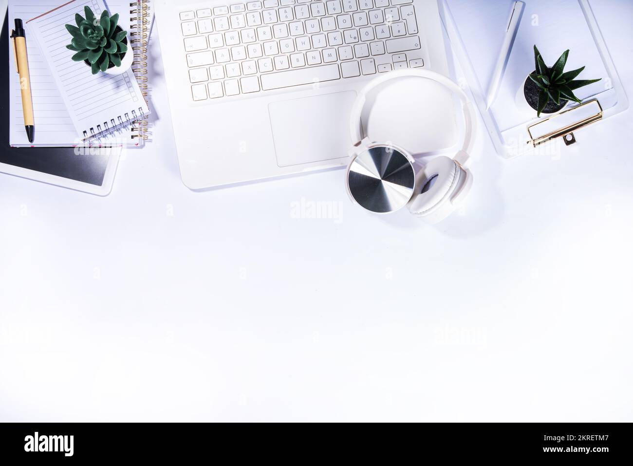 Simple minimalist home office desk workspace with laptop, cactus ...