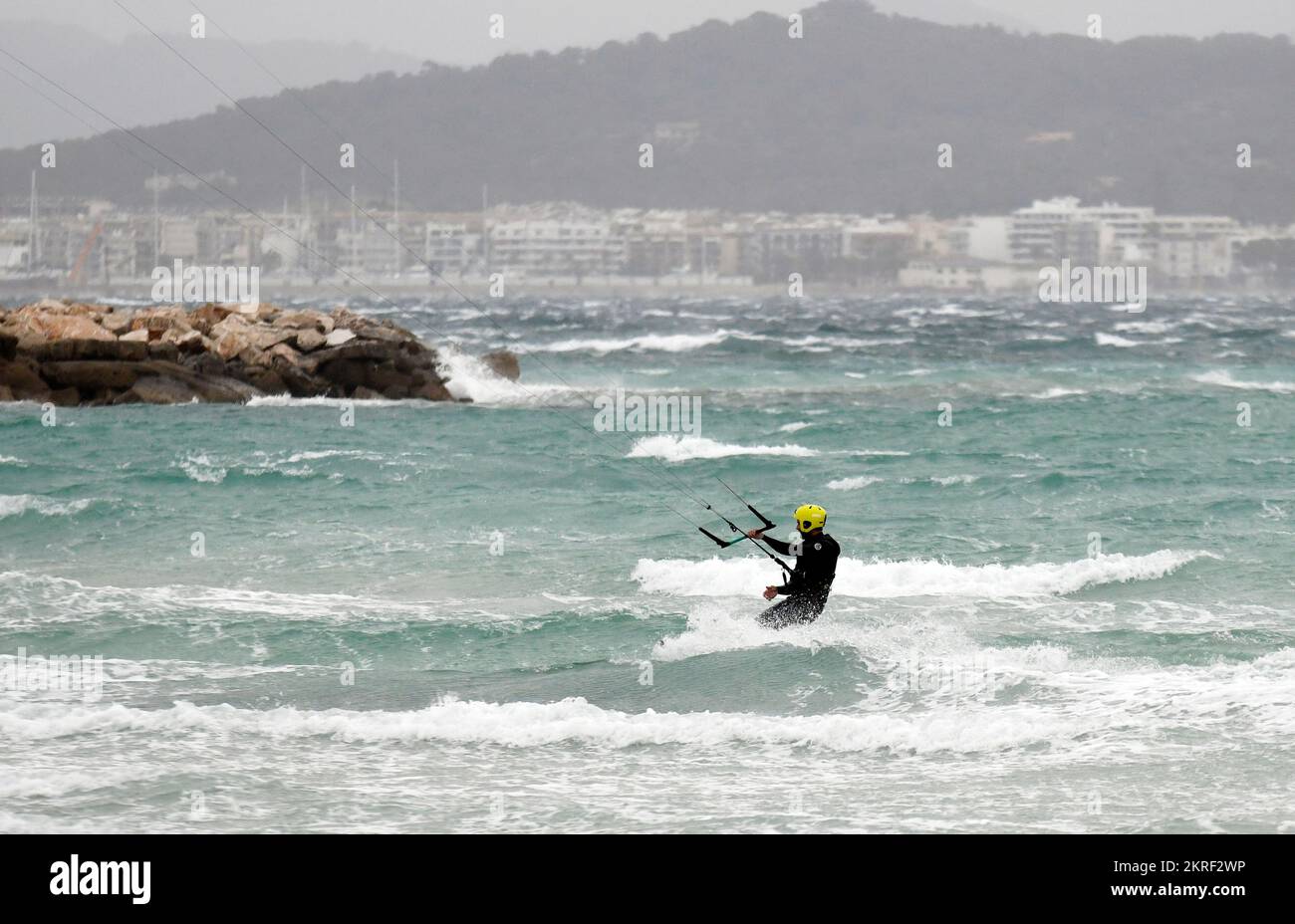 People practising kitesurfing in Playa de Muro, Mallorca, Spain, during ...