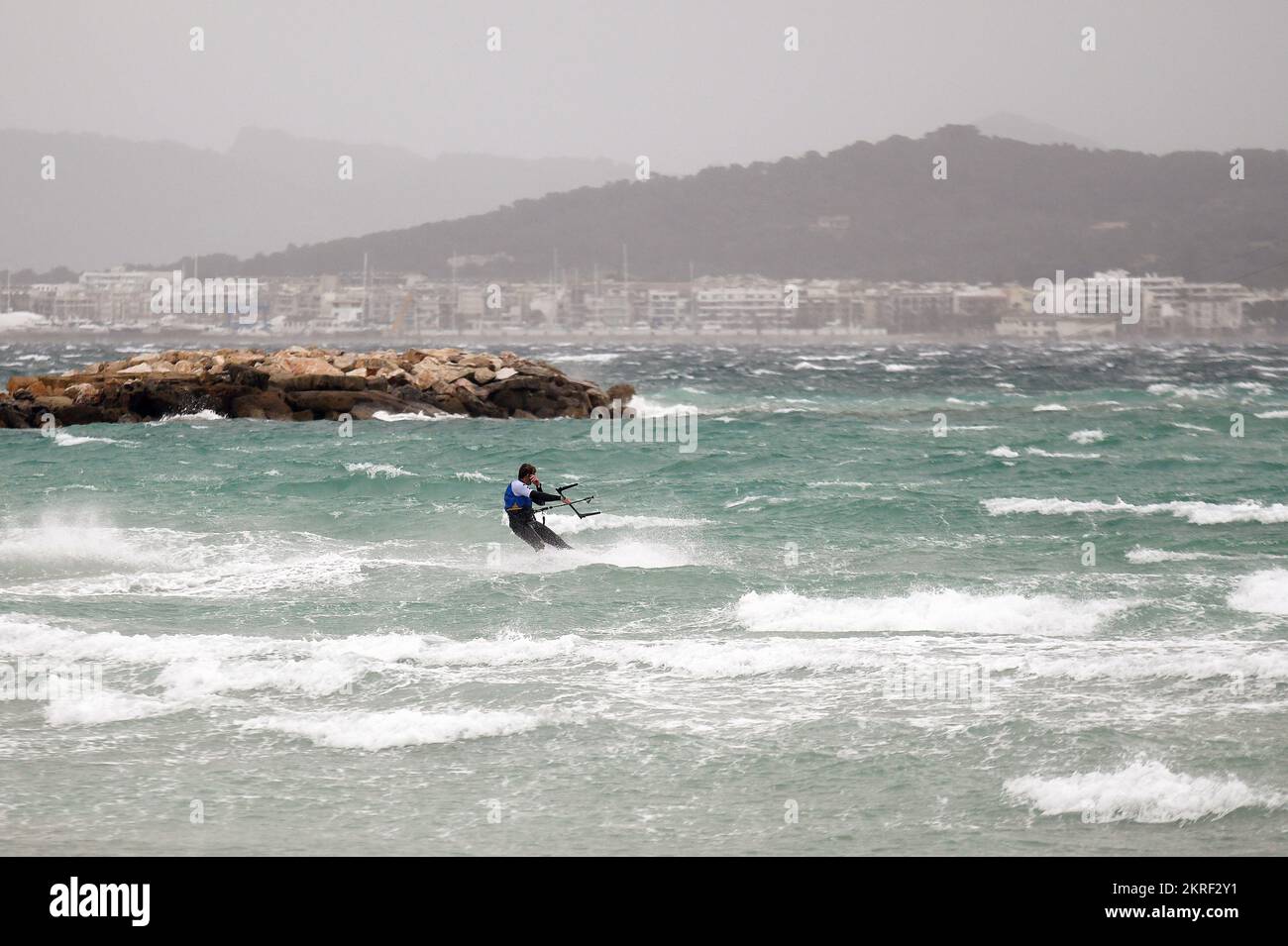 People practising kitesurfing in Playa de Muro, Mallorca, Spain, during ...