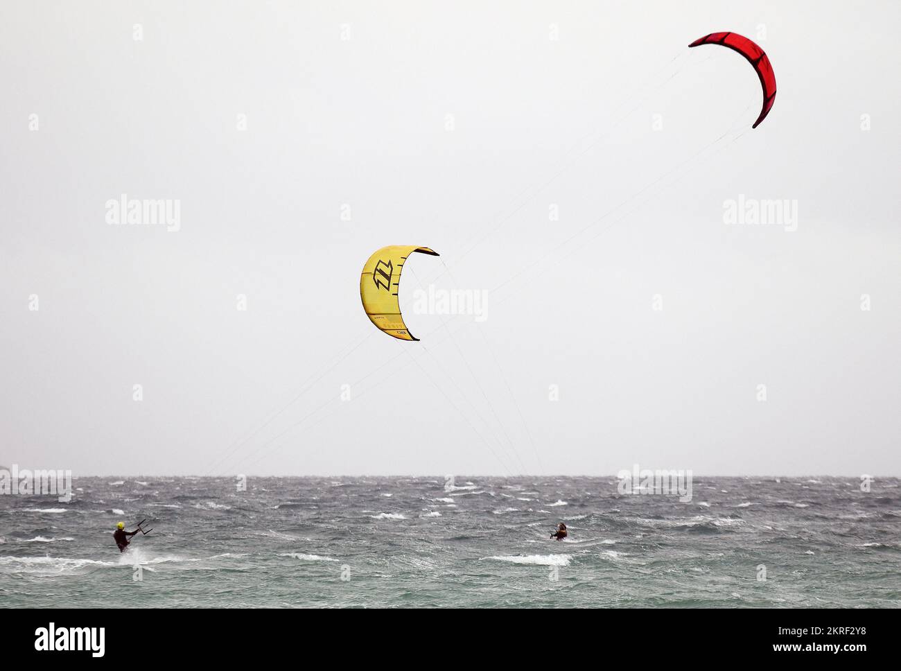 People practising kitesurfing in Playa de Muro, Mallorca, Spain, during ...