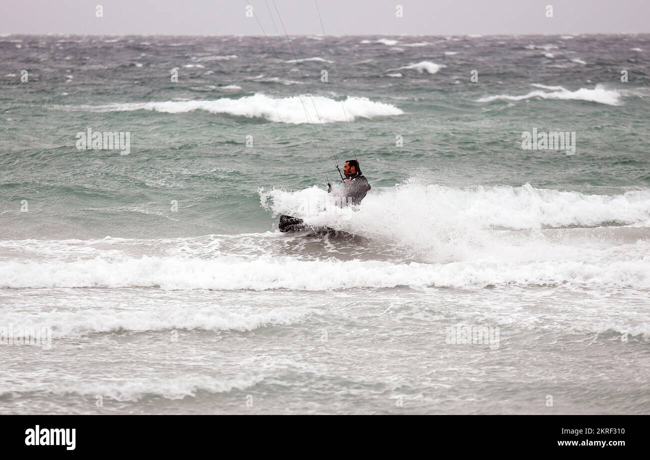 People practising kitesurfing in Playa de Muro, Mallorca, Spain, during ...