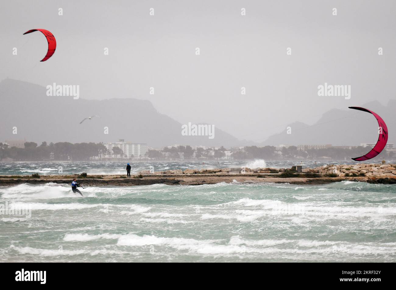 People practising kitesurfing in Playa de Muro, Mallorca, Spain, during ...