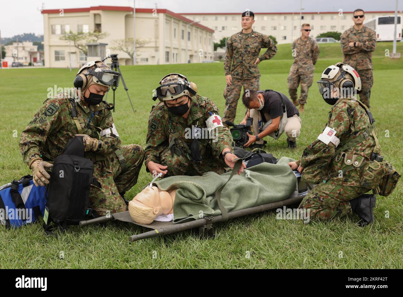 Japan Ground Self Defense Force medical personnel treat a simulated ...