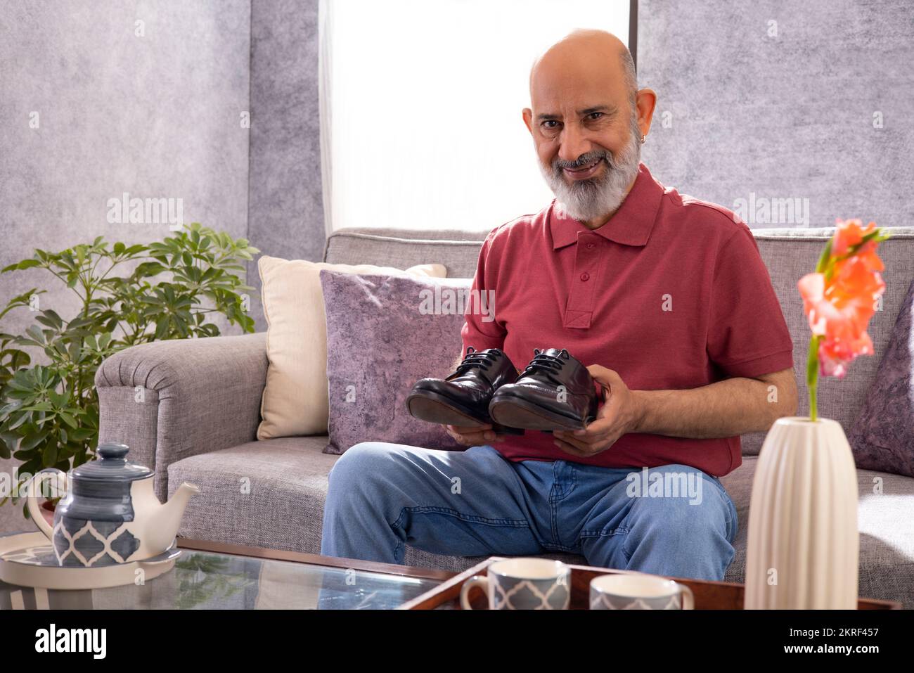Retired man remembering about his past career Stock Photo - Alamy