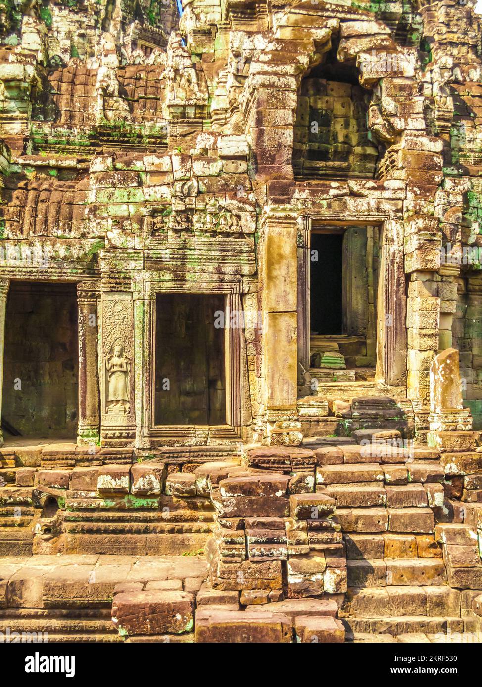 Detail of the ancient Bayon ruins at the Angkor Wat temple complex ...
