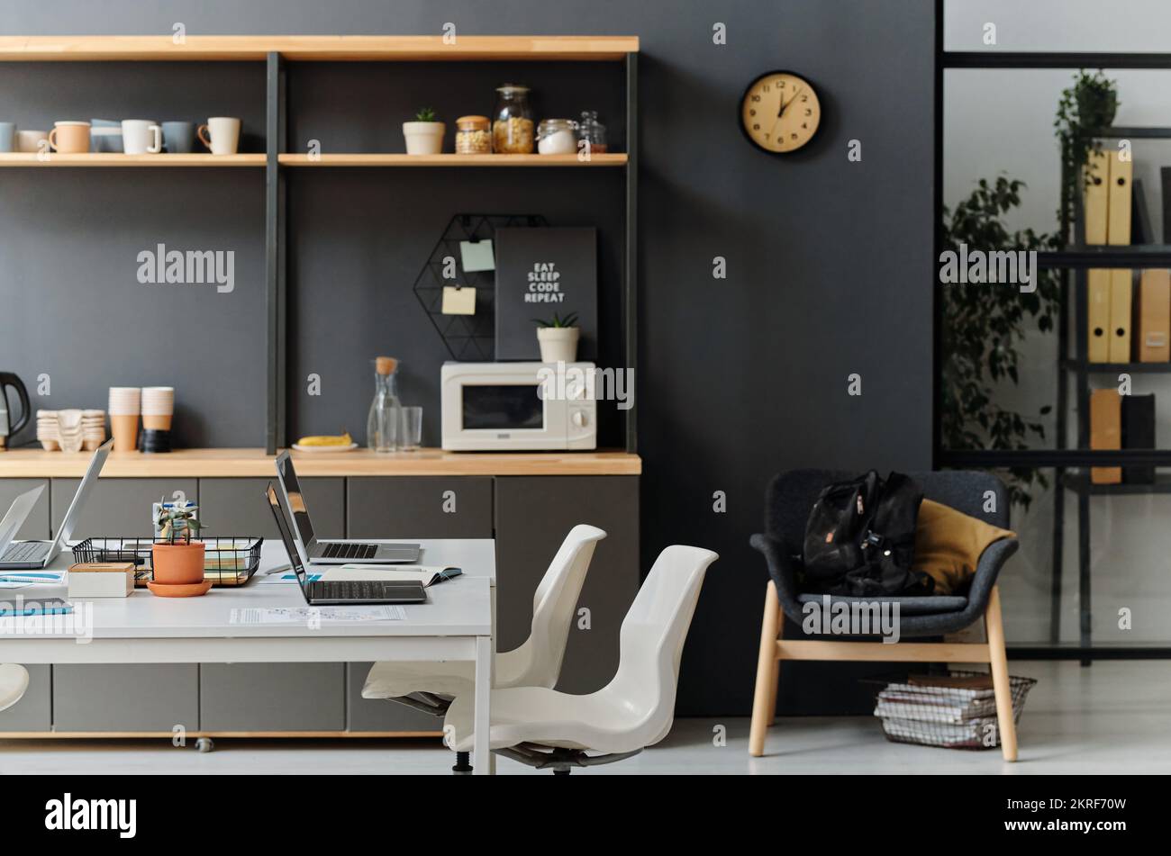 Horizontal image of modern office with workplace with computers on it ...