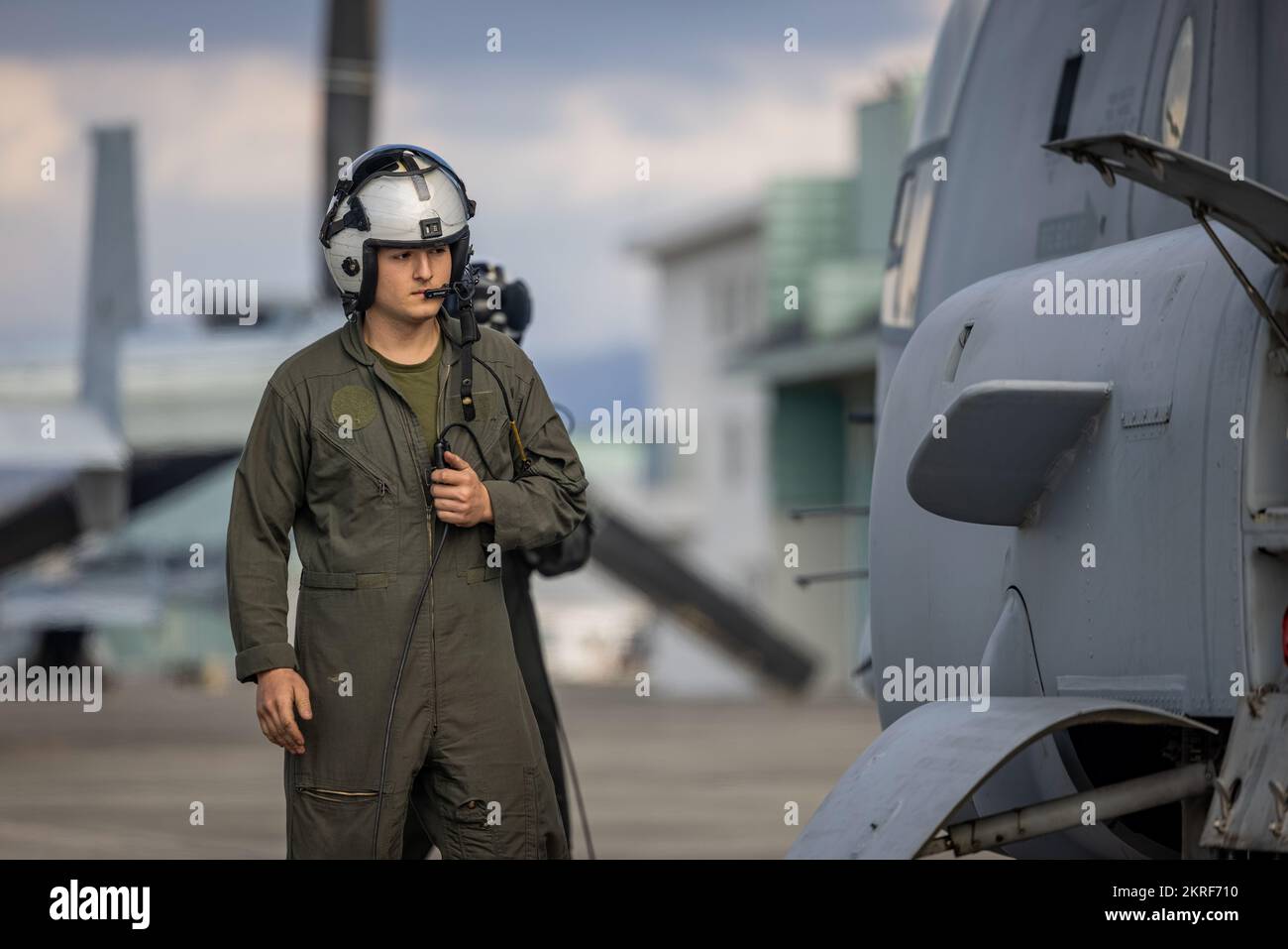 U.S. Marine Corps Cpl. Ryan Lewis, an MV-22B Osprey crew chief with ...
