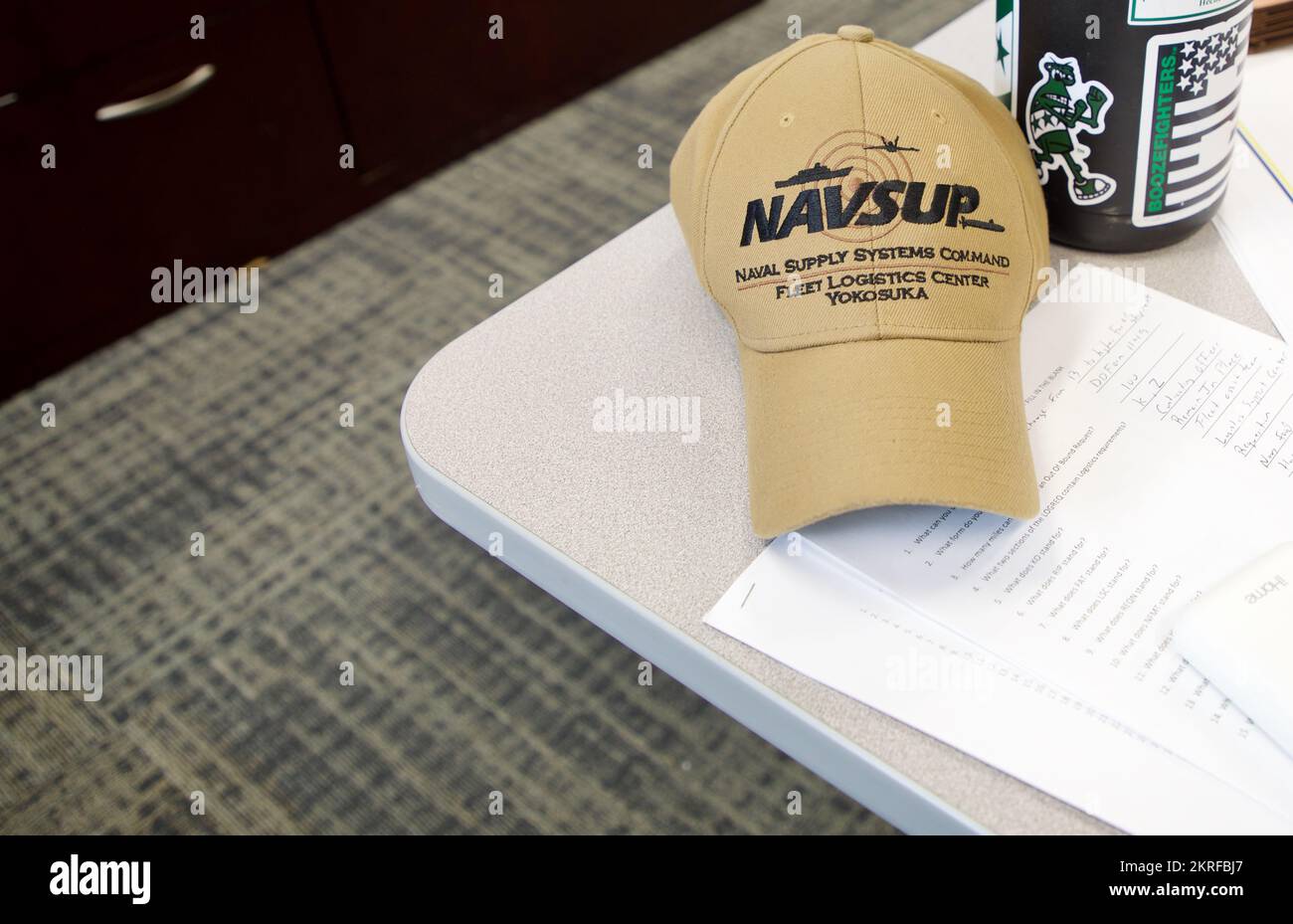 A ball cap belonging to a Reservist attached to Naval Supply Systems ...