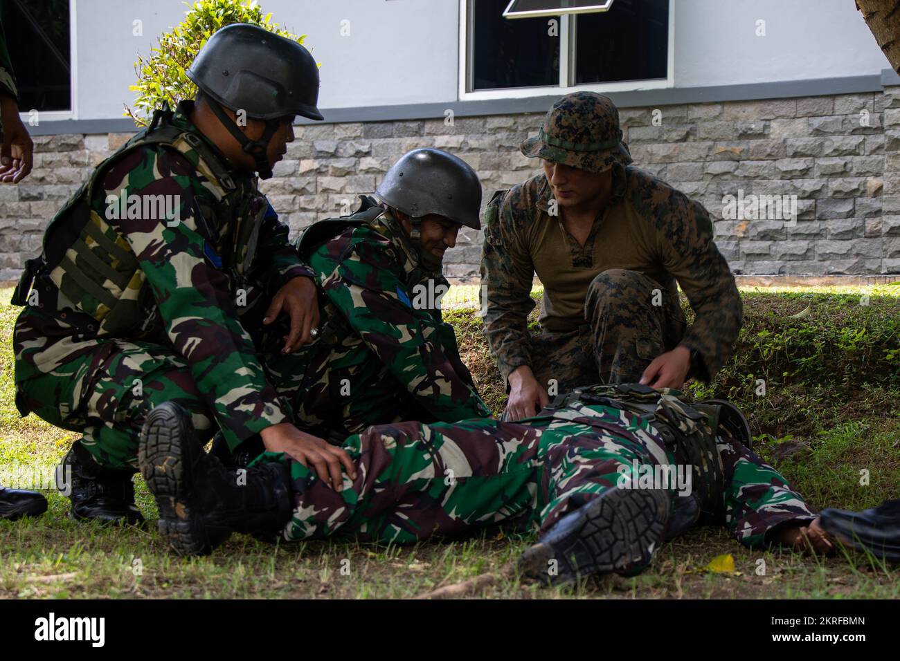U.S. Navy Hosptial Corpsman 2nd Class Luis Necochea, right, a special ...